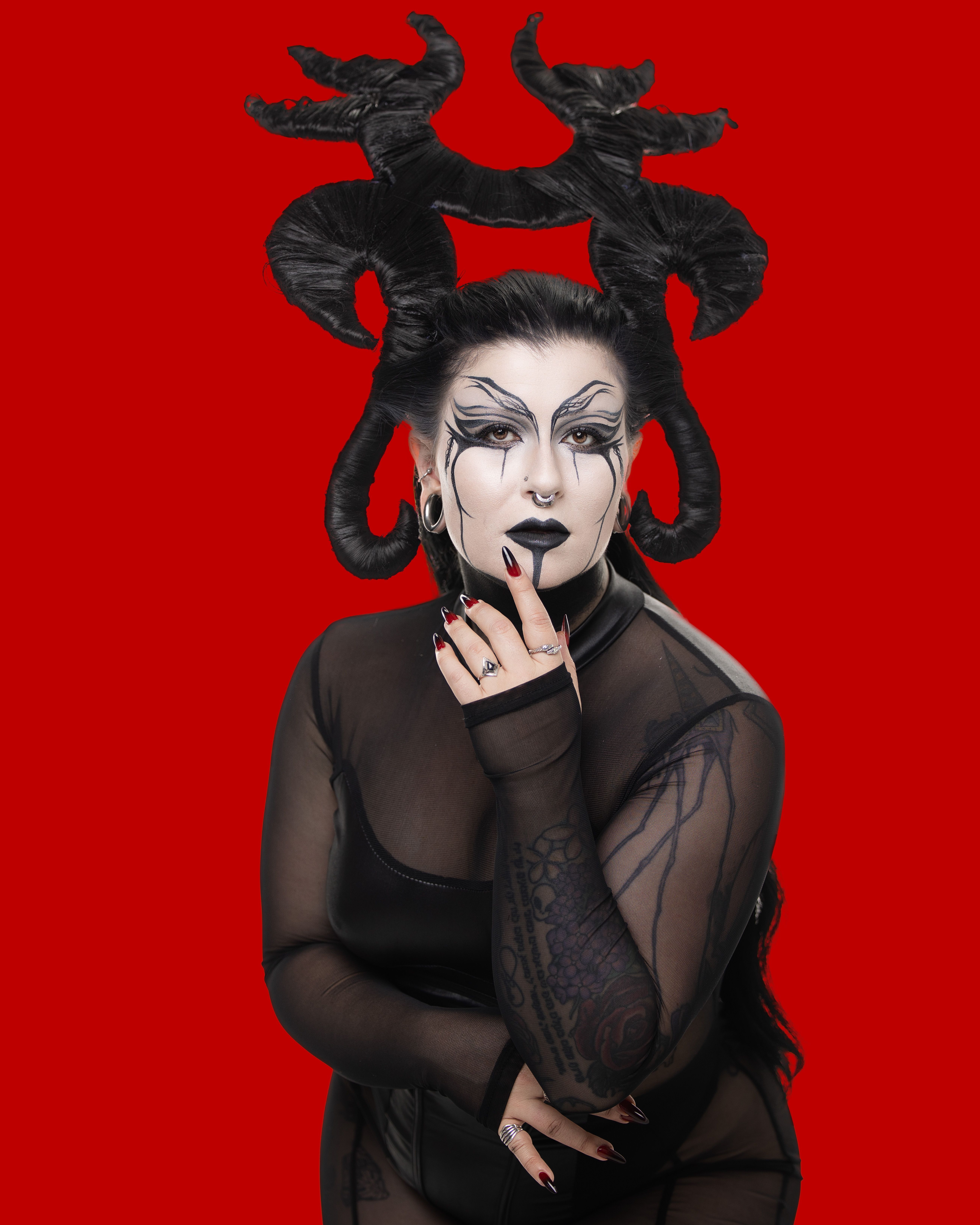 Gothic Style Portrait with Dramatic Hairstyle · Free Stock Photo