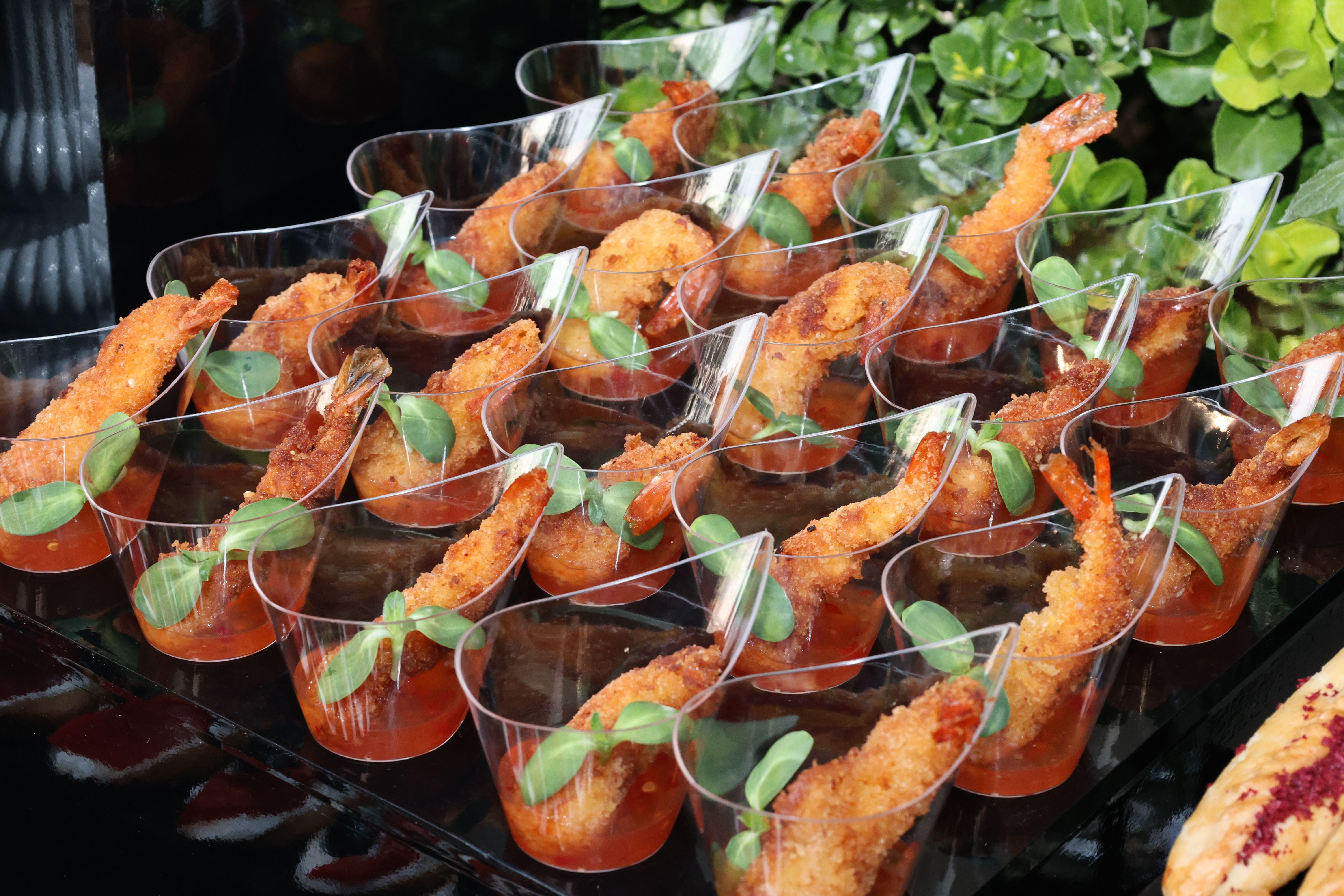 Delicious Breaded Shrimp in Cocktail Cups Display · Free Stock Photo