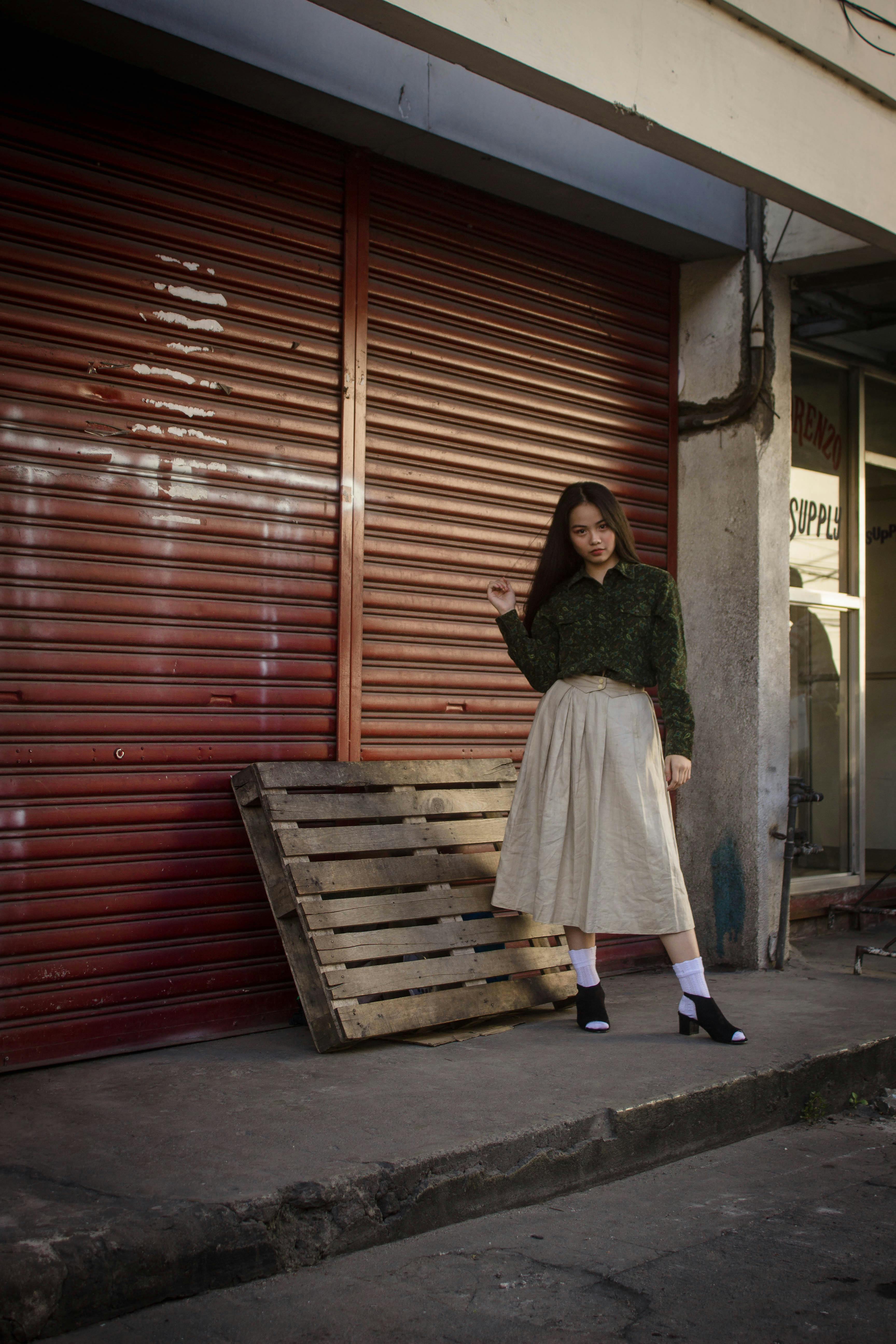 Woman Leaning Against Window · Free Stock Photo