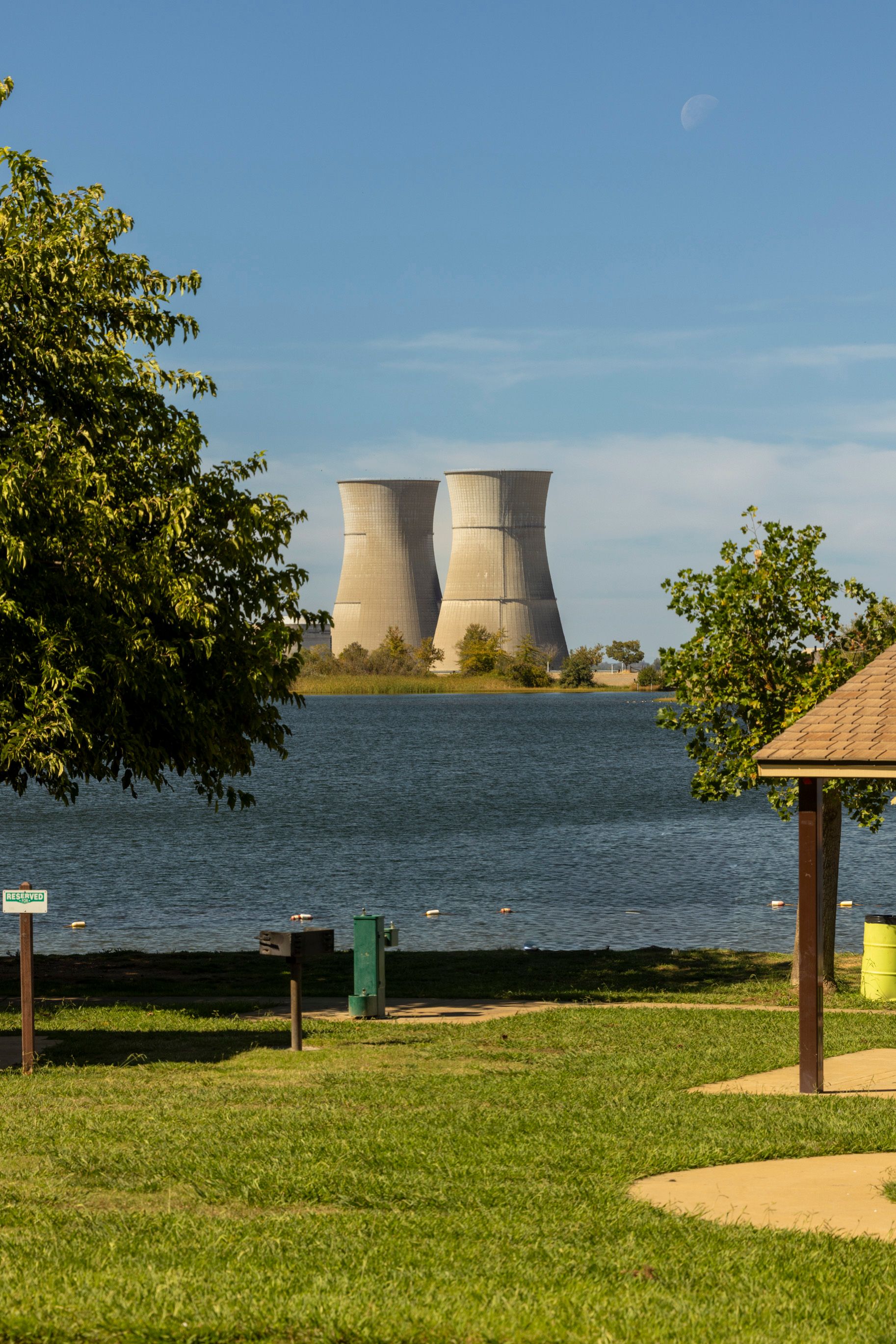 Cooling Towers by a Scenic Lake on a Sunny Day · Free Stock Photo
