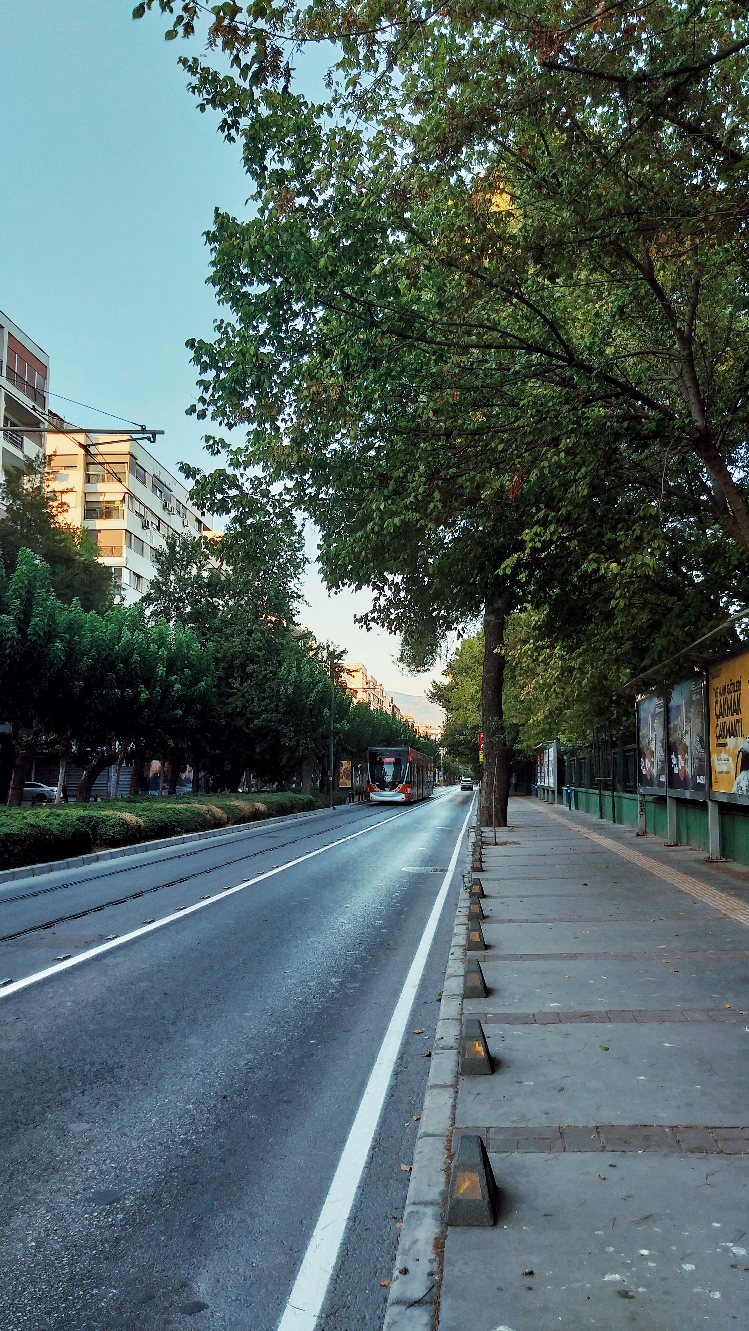Urban Street Scene with Underpass and Cars · Free Stock Photo