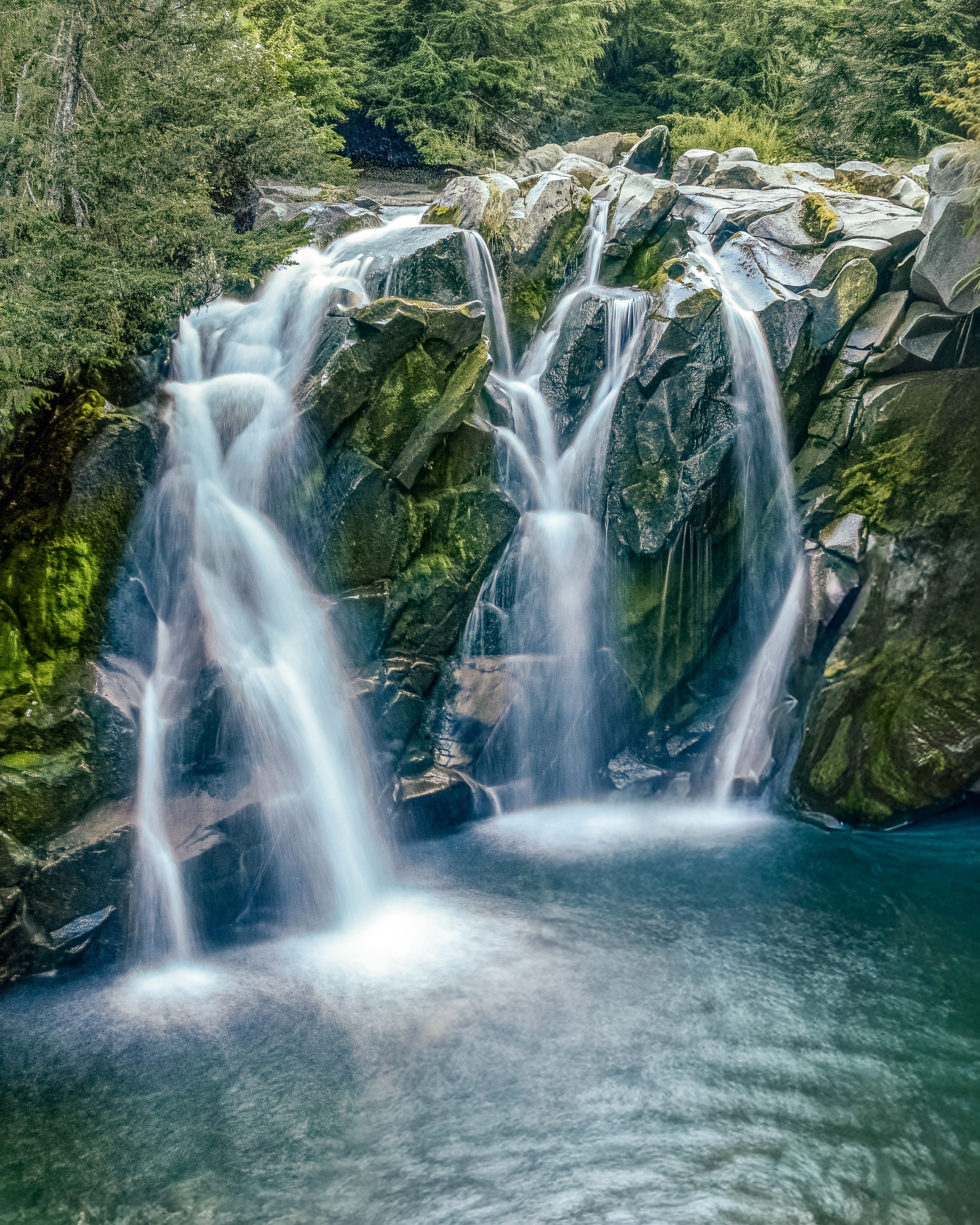 Scenic Waterfall in Lush Forest Landscape · Free Stock Photo