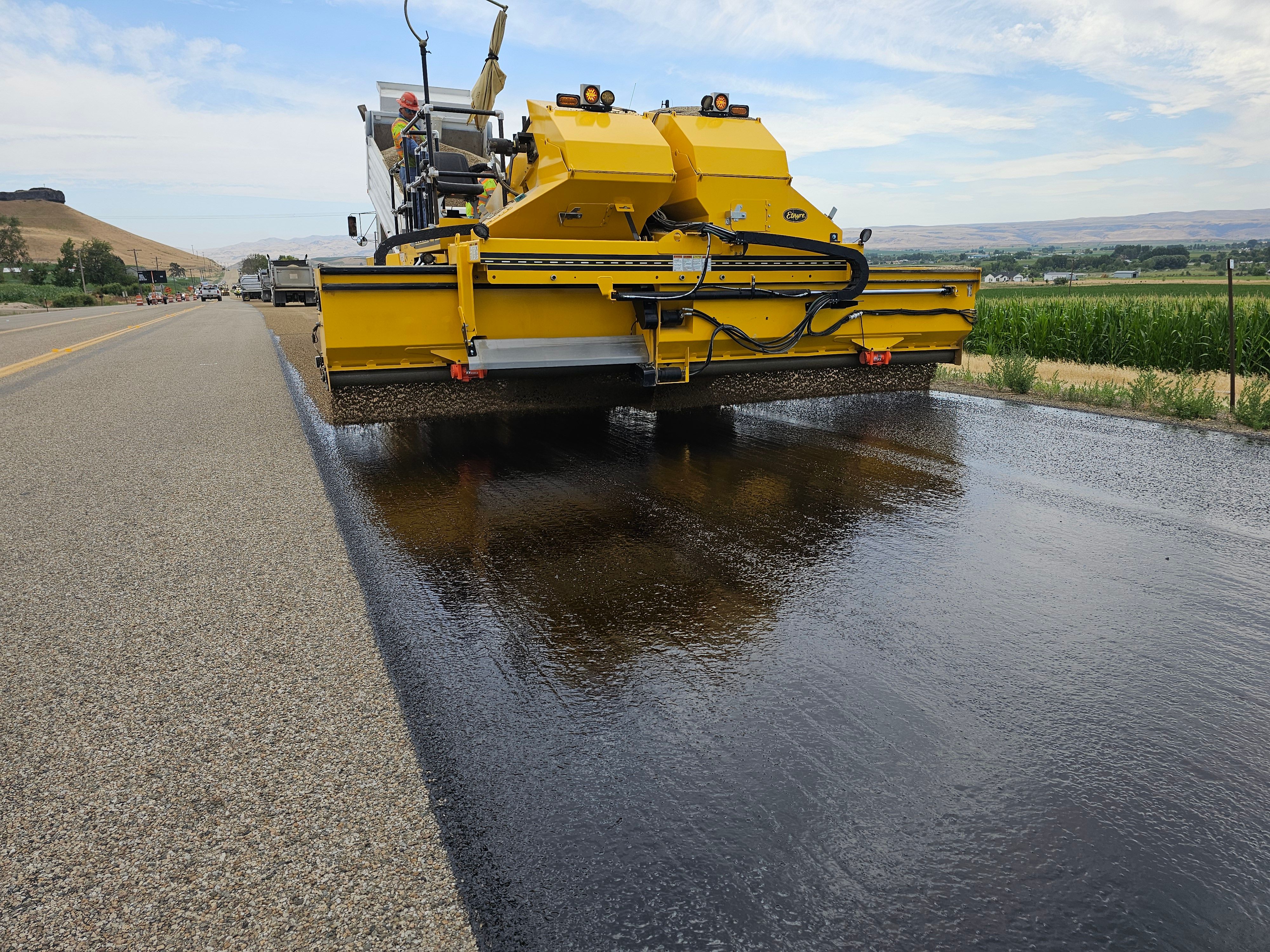 Road Construction with Yellow Asphalt Machine in Idaho · Free Stock Photo