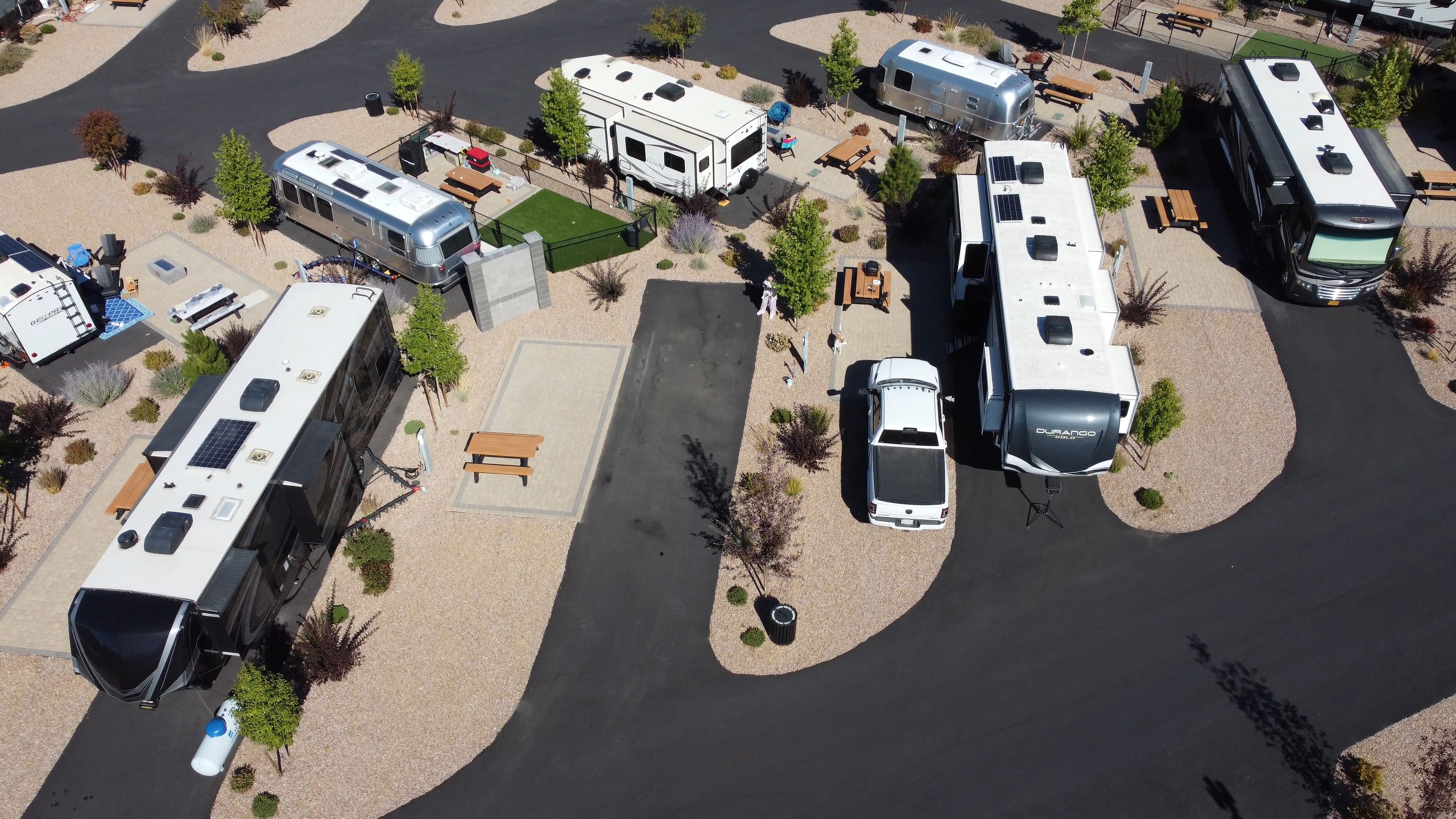 Aerial View of RV Park with Campers and Trailers · Free Stock Photo