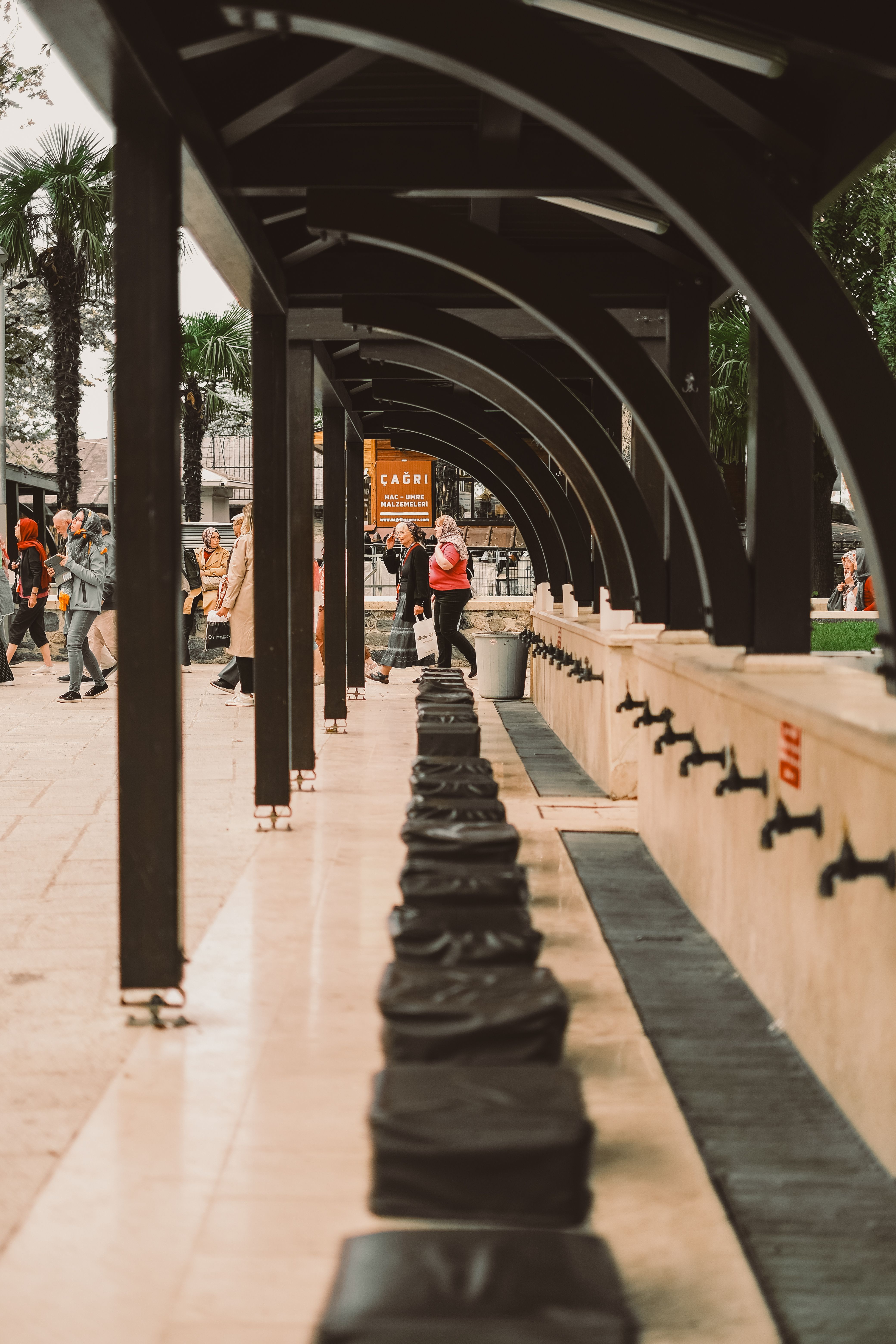 Architectural walkway with people in public space · Free Stock Photo