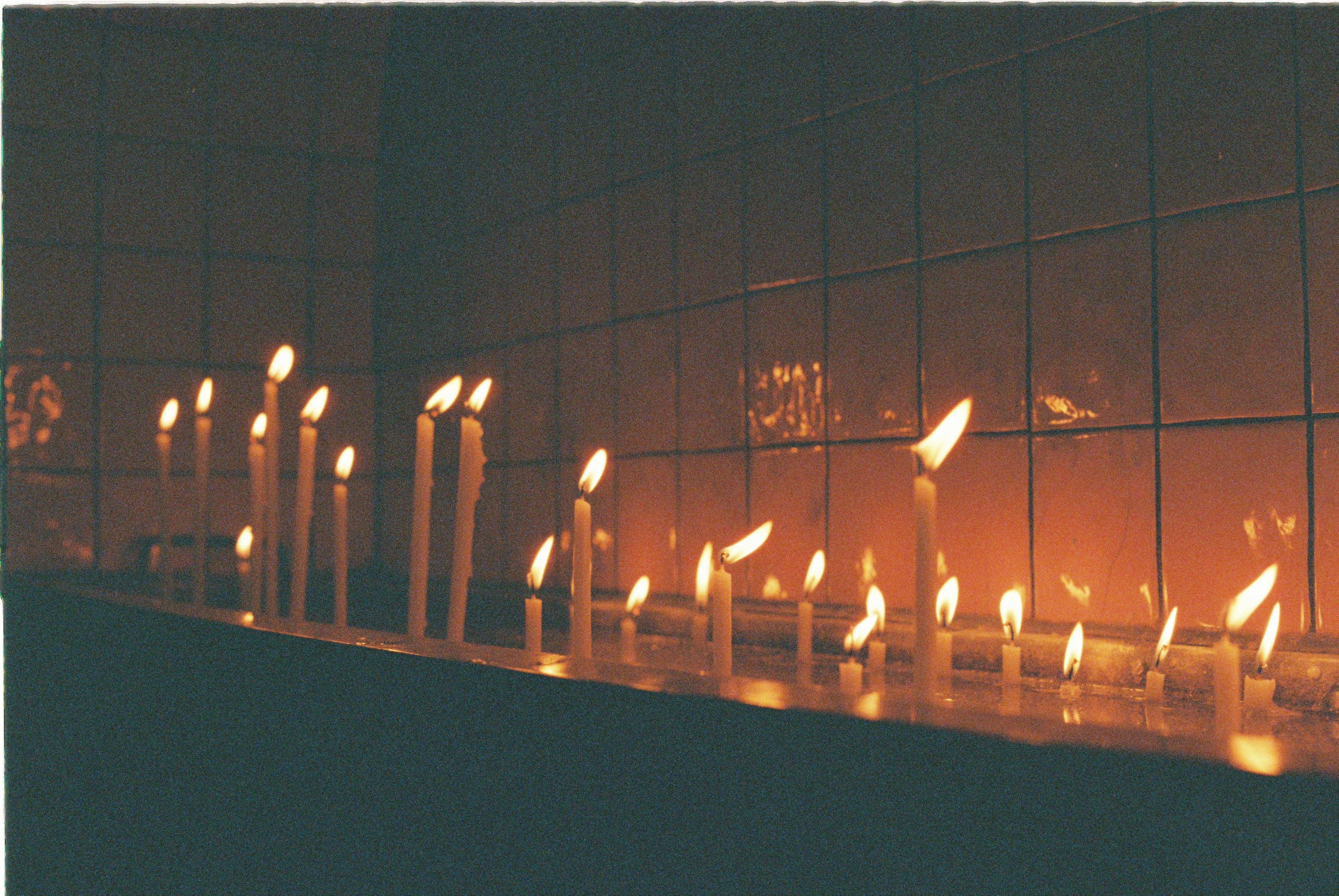 Warm Glow of Candlelight Reflection · Free Stock Photo