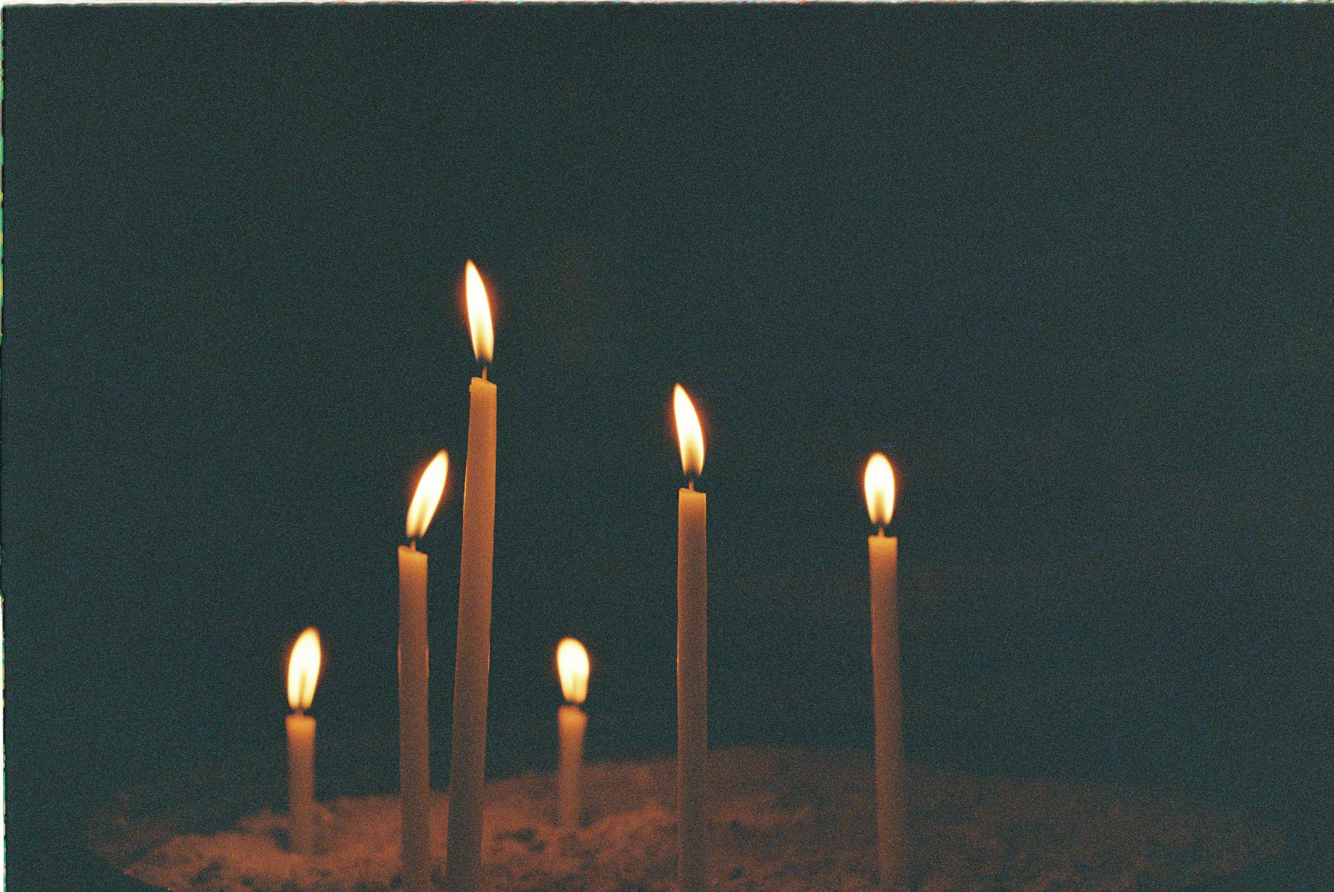Moody Candlelit Scene with Six Candles · Free Stock Photo