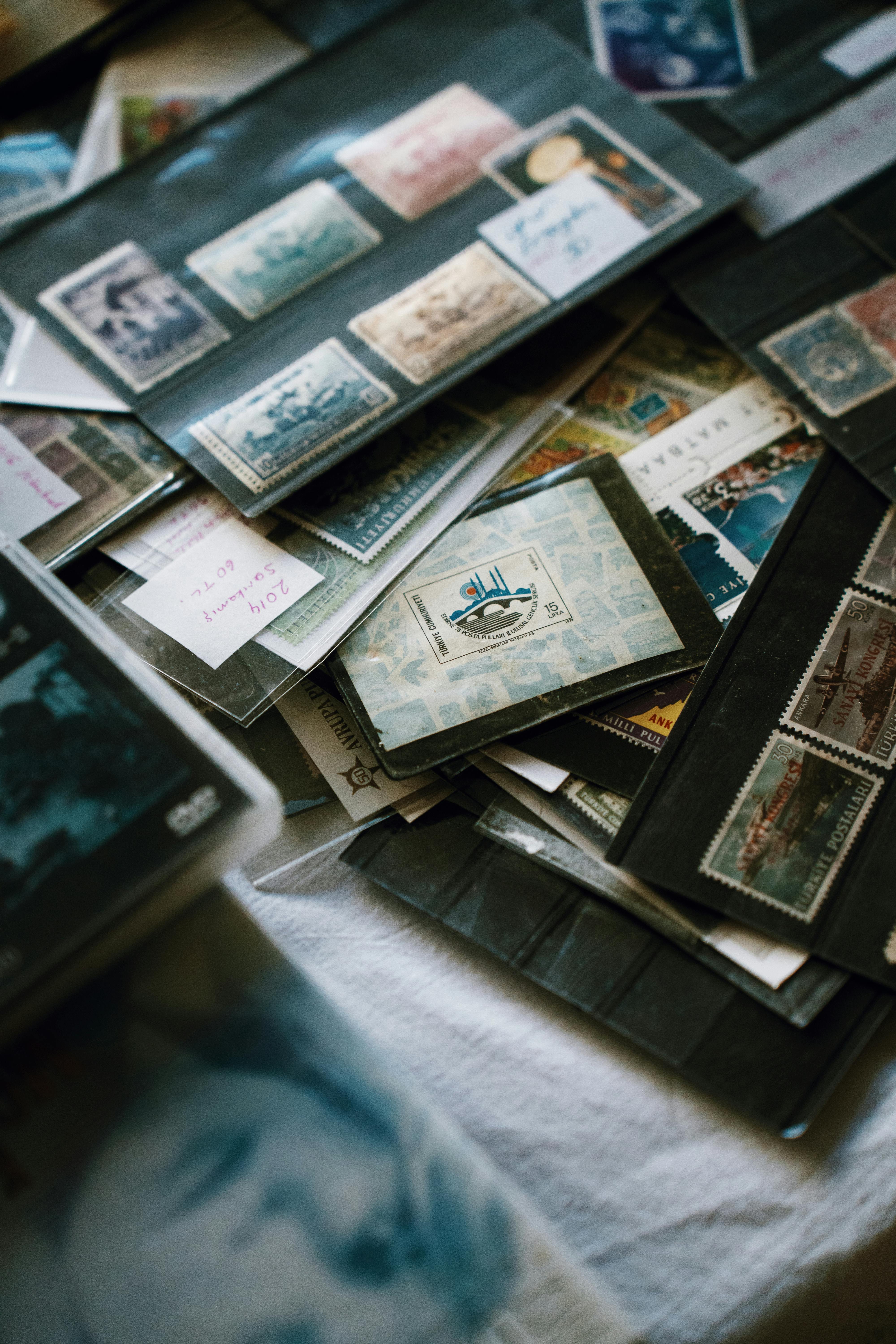 Assorted Photos on Table · Free Stock Photo