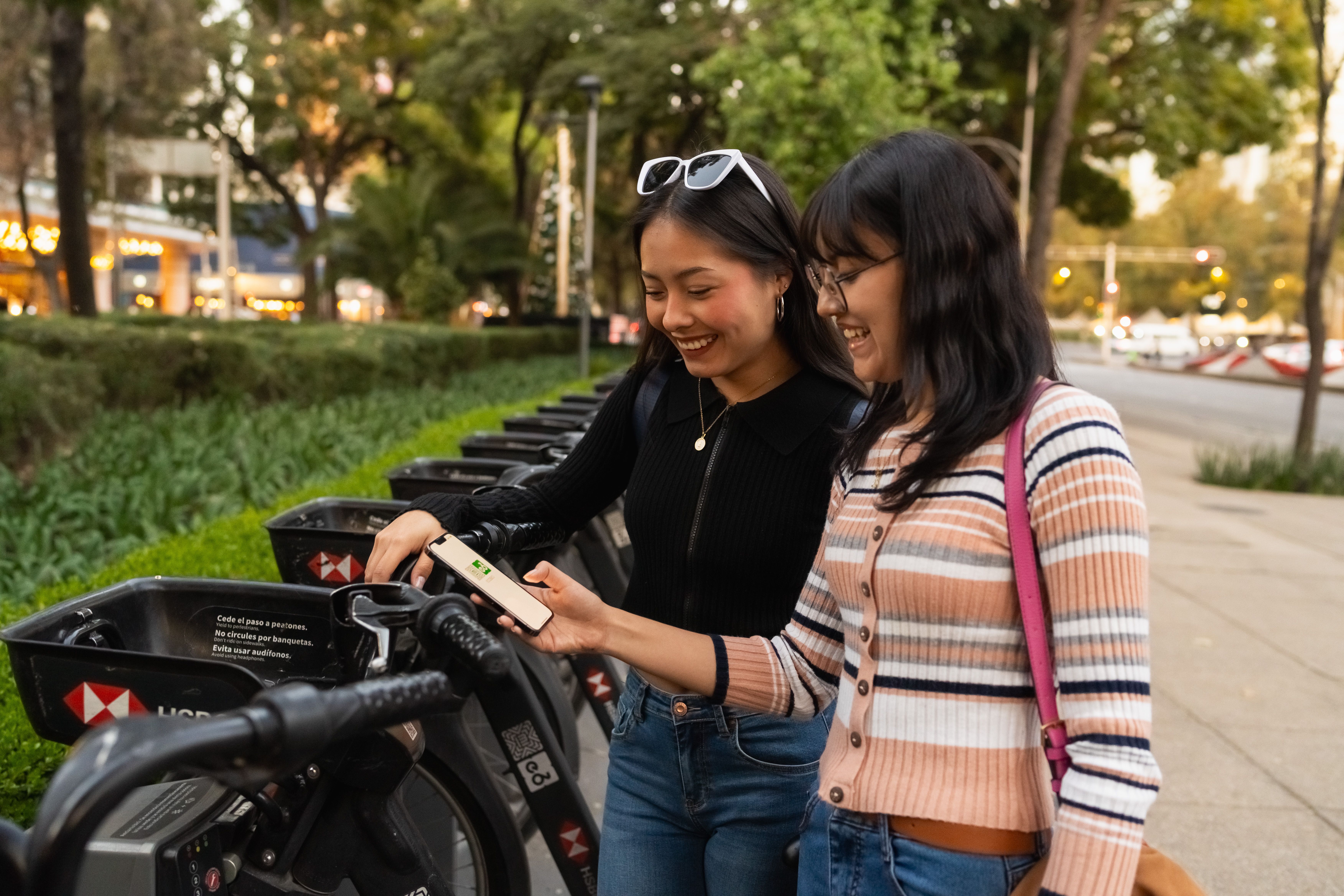 Young Women Using Rentable Bikes in Mexico City · Free Stock Photo