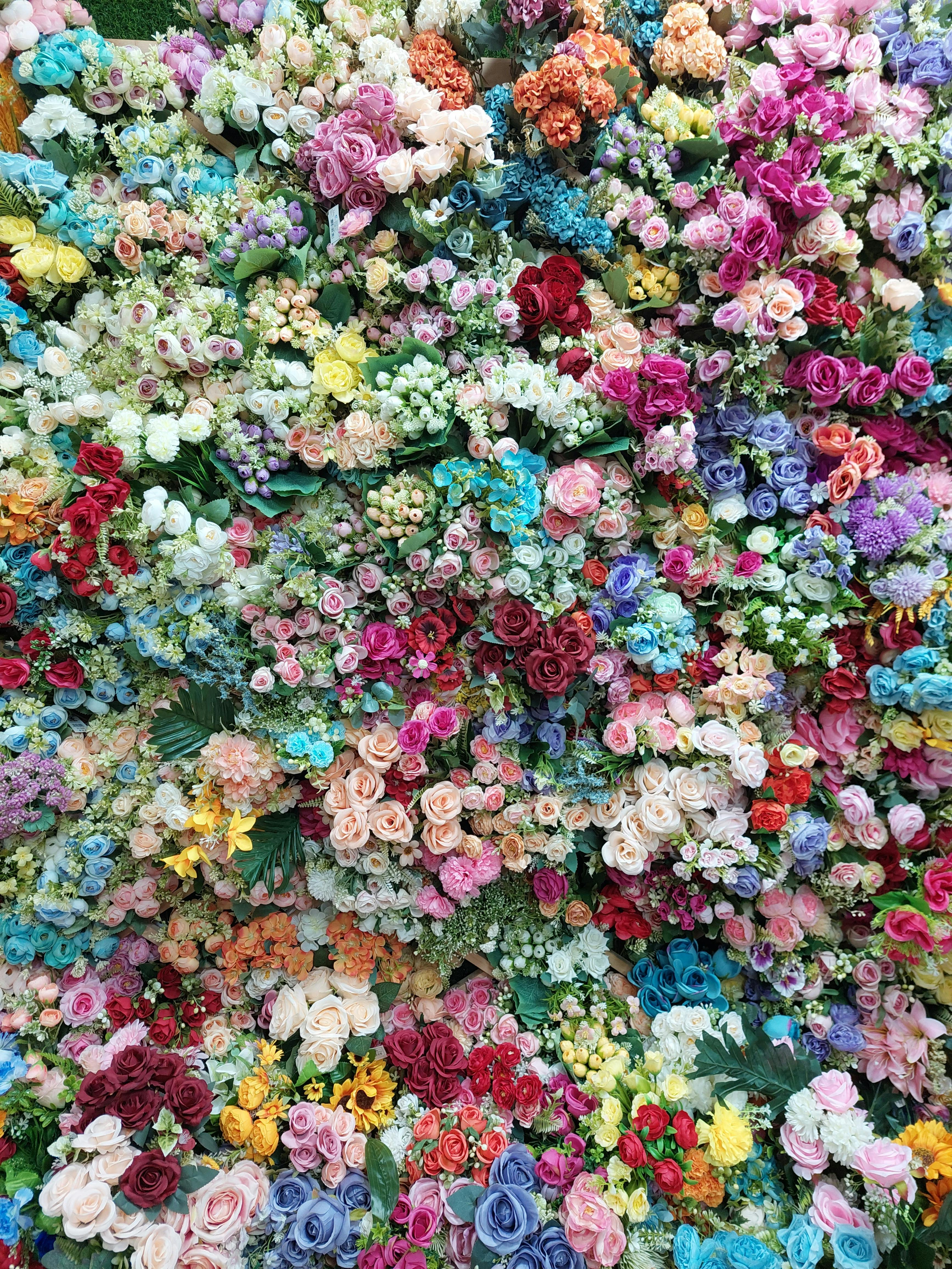 Vibrant Floral Arrangement with Diverse Flowers · Free Stock Photo