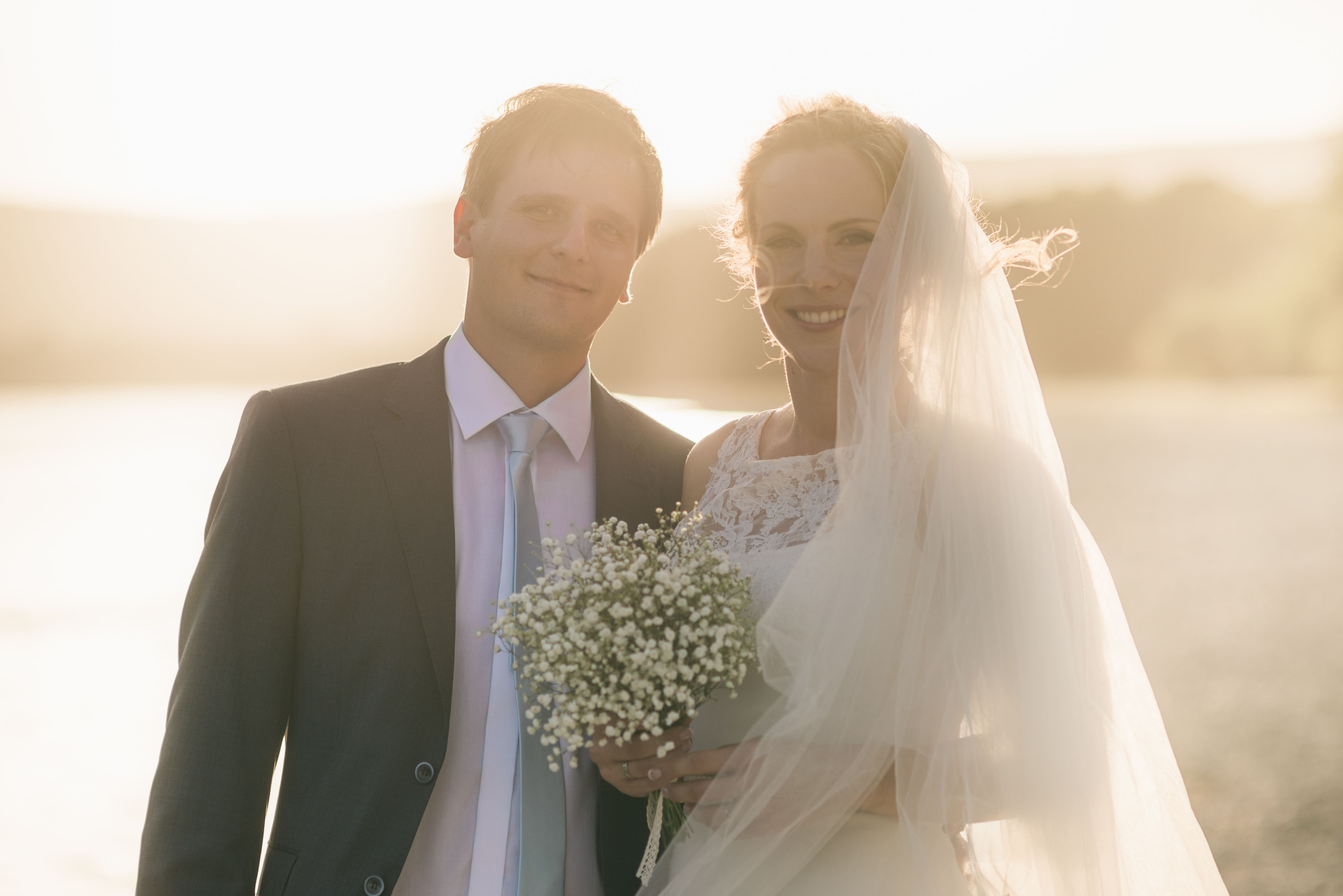 Romantic Outdoor Wedding Portrait at Sunset · Free Stock Photo