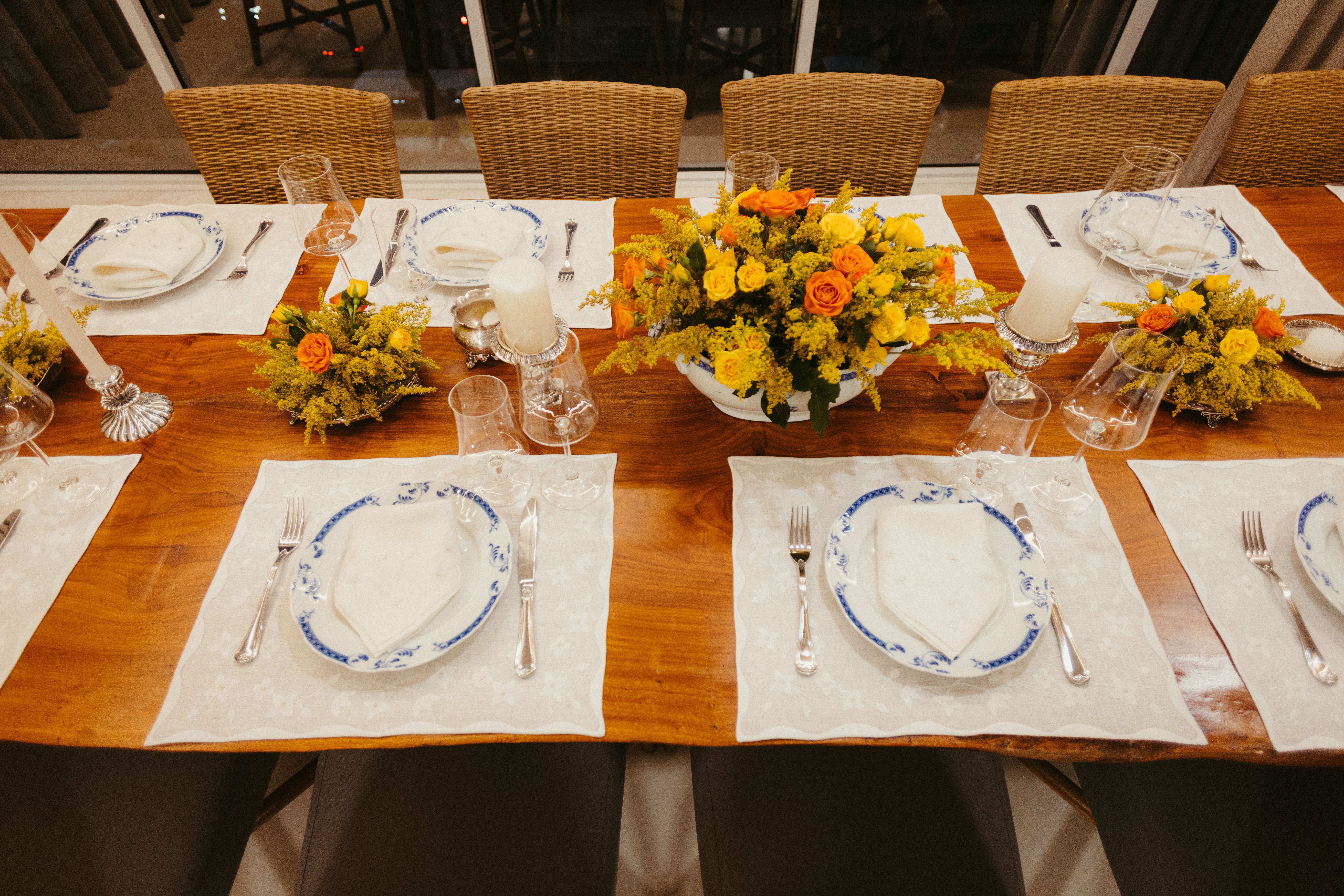 Elegant Dining Table with Floral Centerpieces · Free Stock Photo