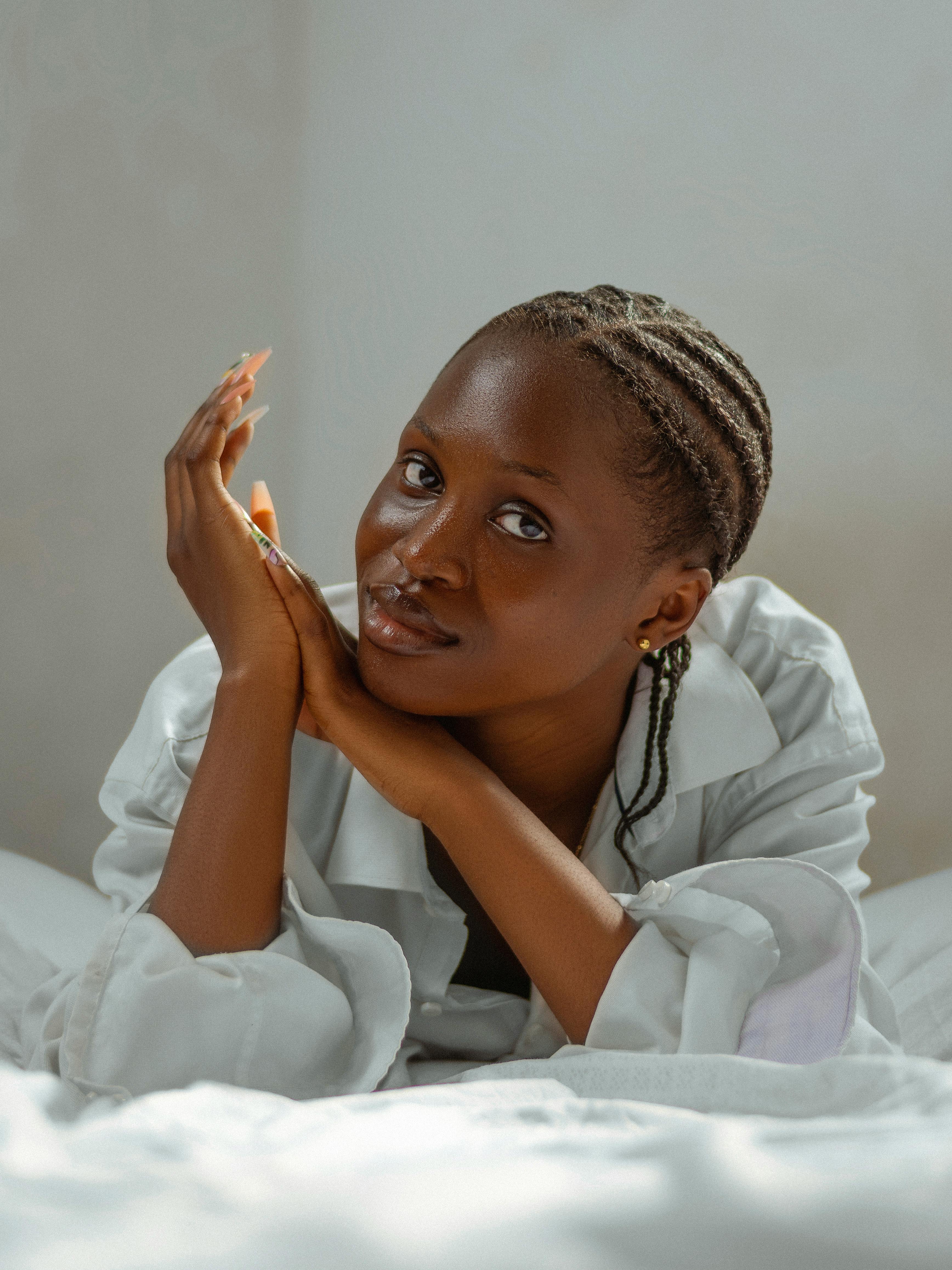 Relaxed Portrait of a Woman with Natural Hairstyle · Free Stock Photo
