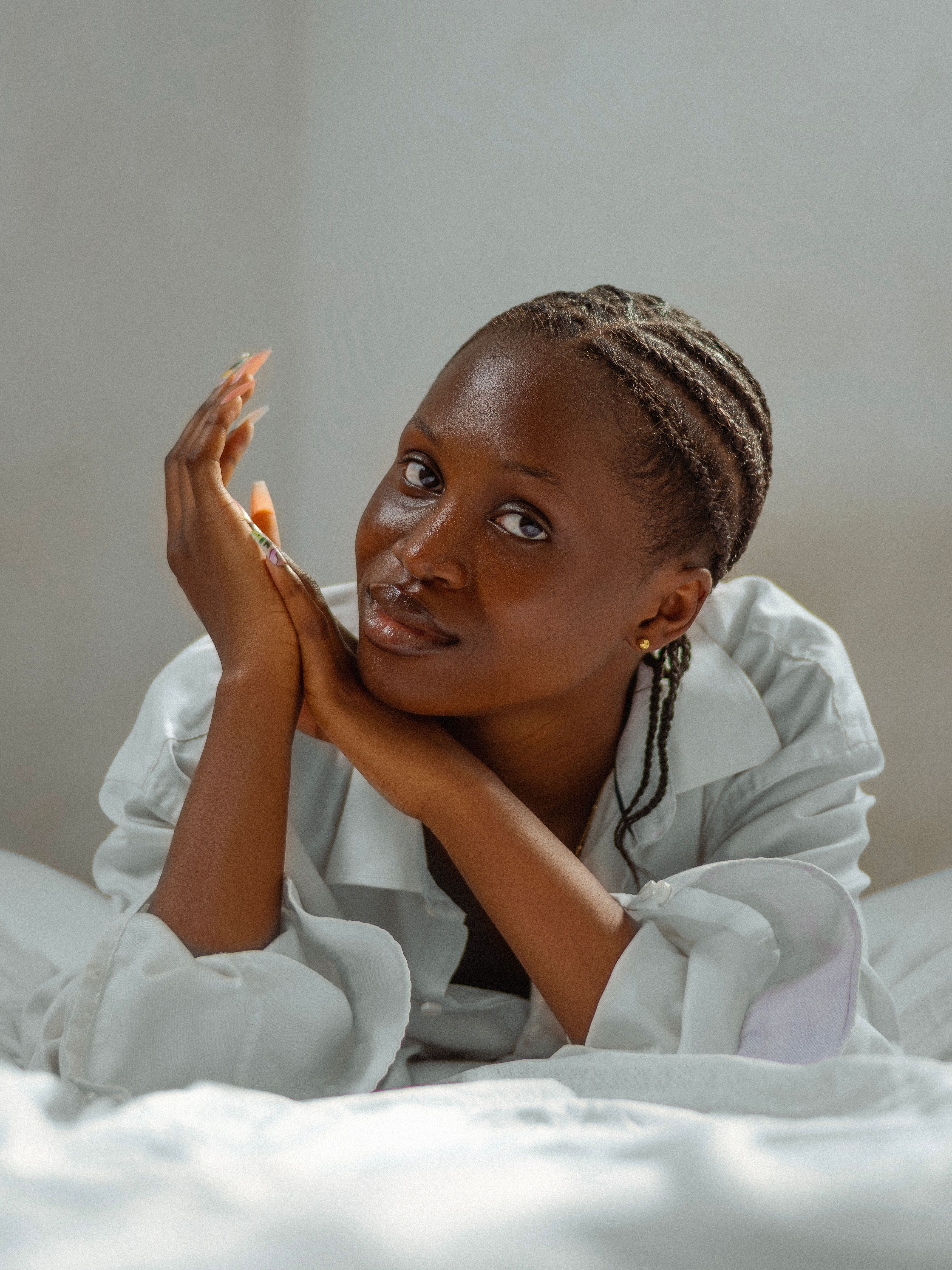 Relaxed Portrait of a Woman with Natural Hairstyle · Free Stock Photo