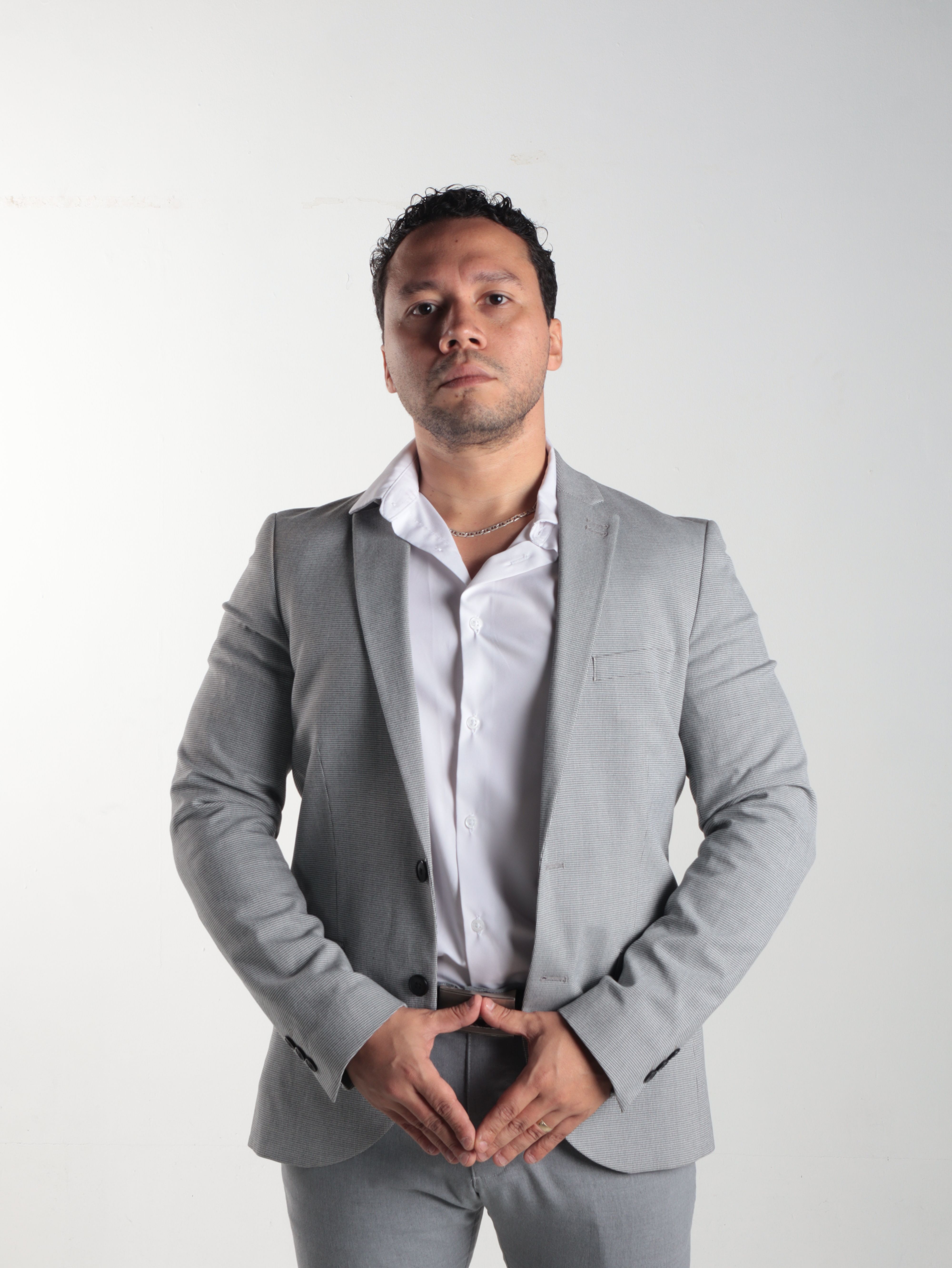 Confident Businessman in Gray Suit Portrait · Free Stock Photo
