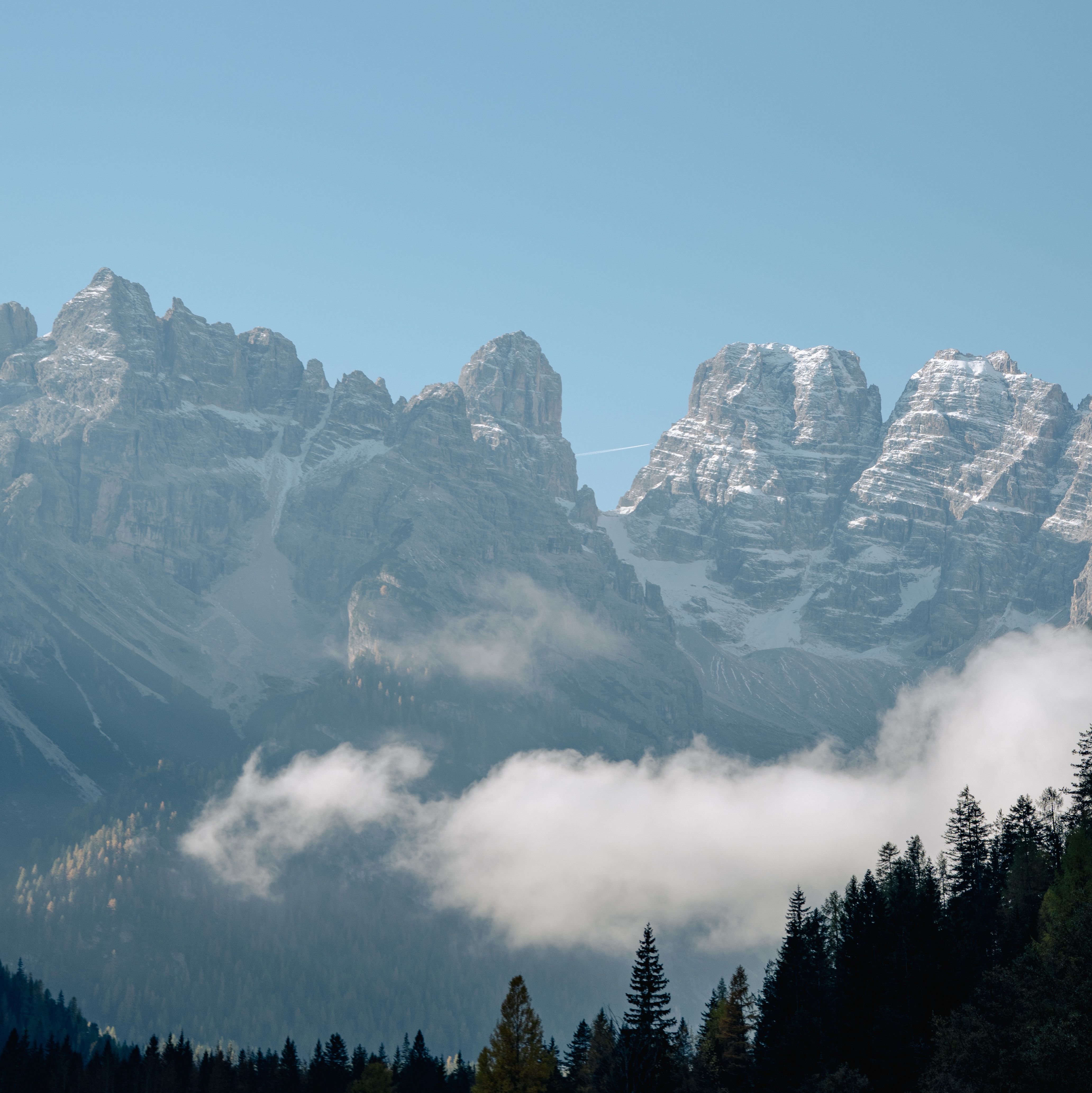 Ethereal Mountain Landscape with Misty Clouds · Free Stock Photo
