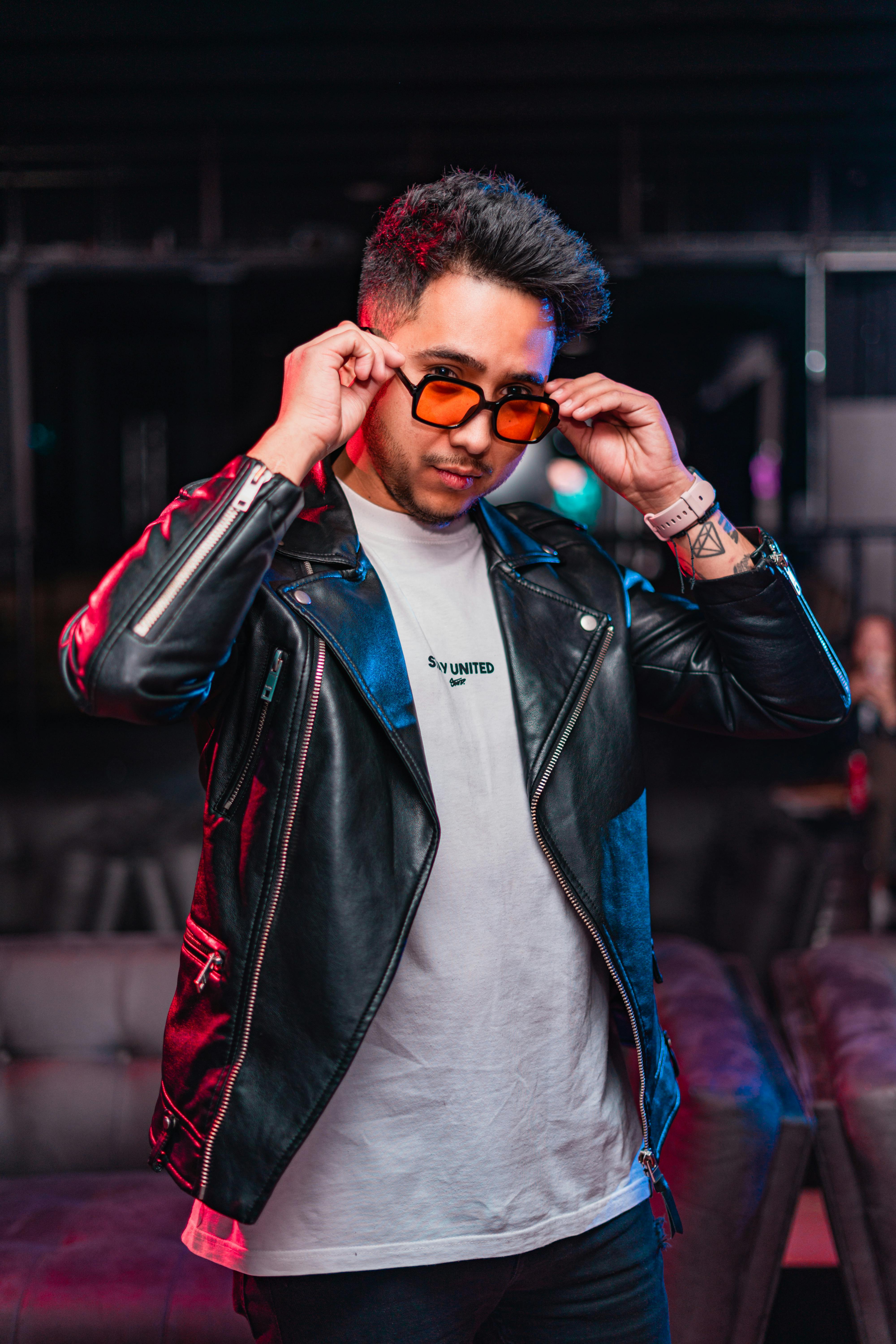 Trendy Young Adult in Leather Jacket and Sunglasses · Free Stock Photo