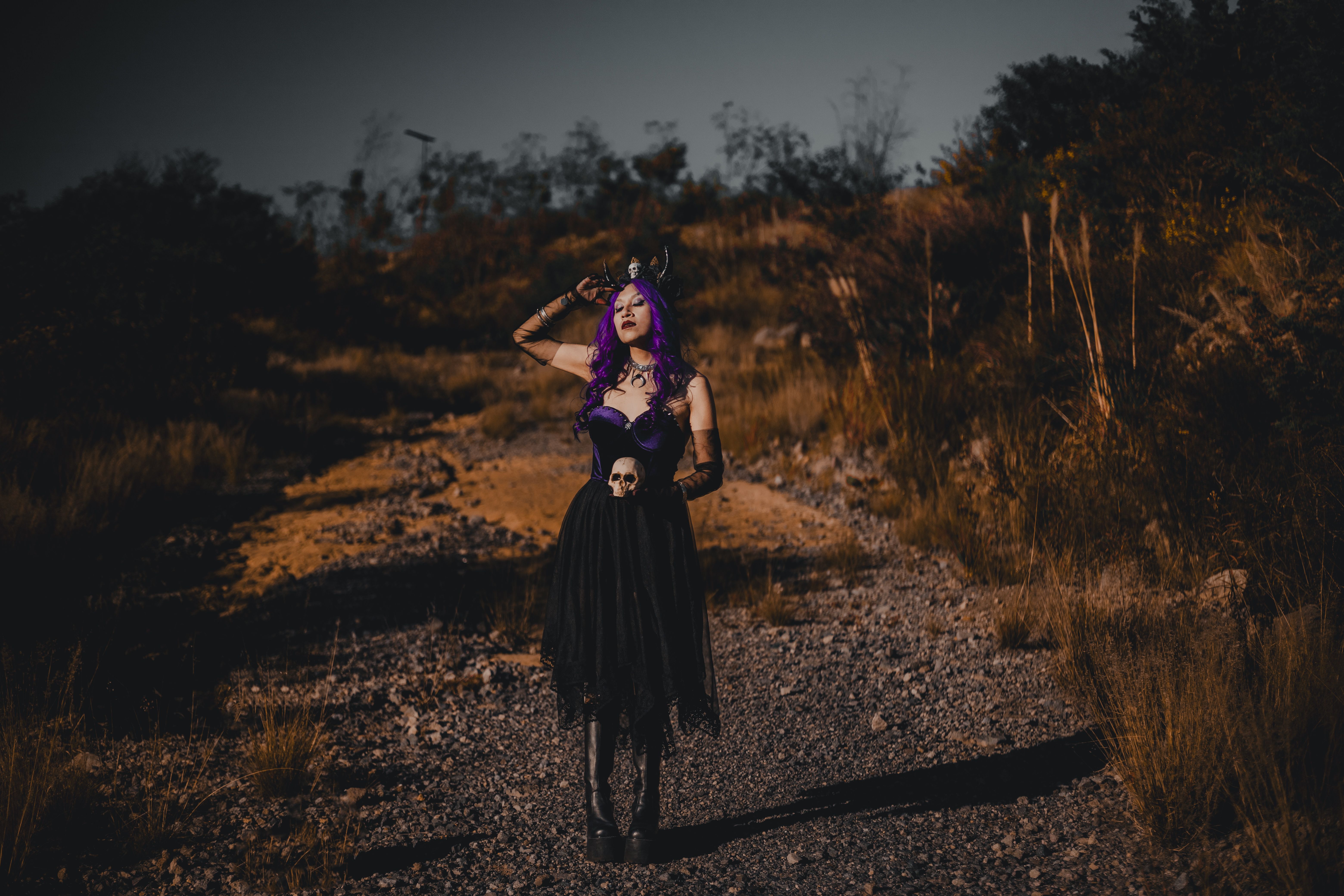 Gothic Cosplay in Dark Outdoor Setting · Free Stock Photo