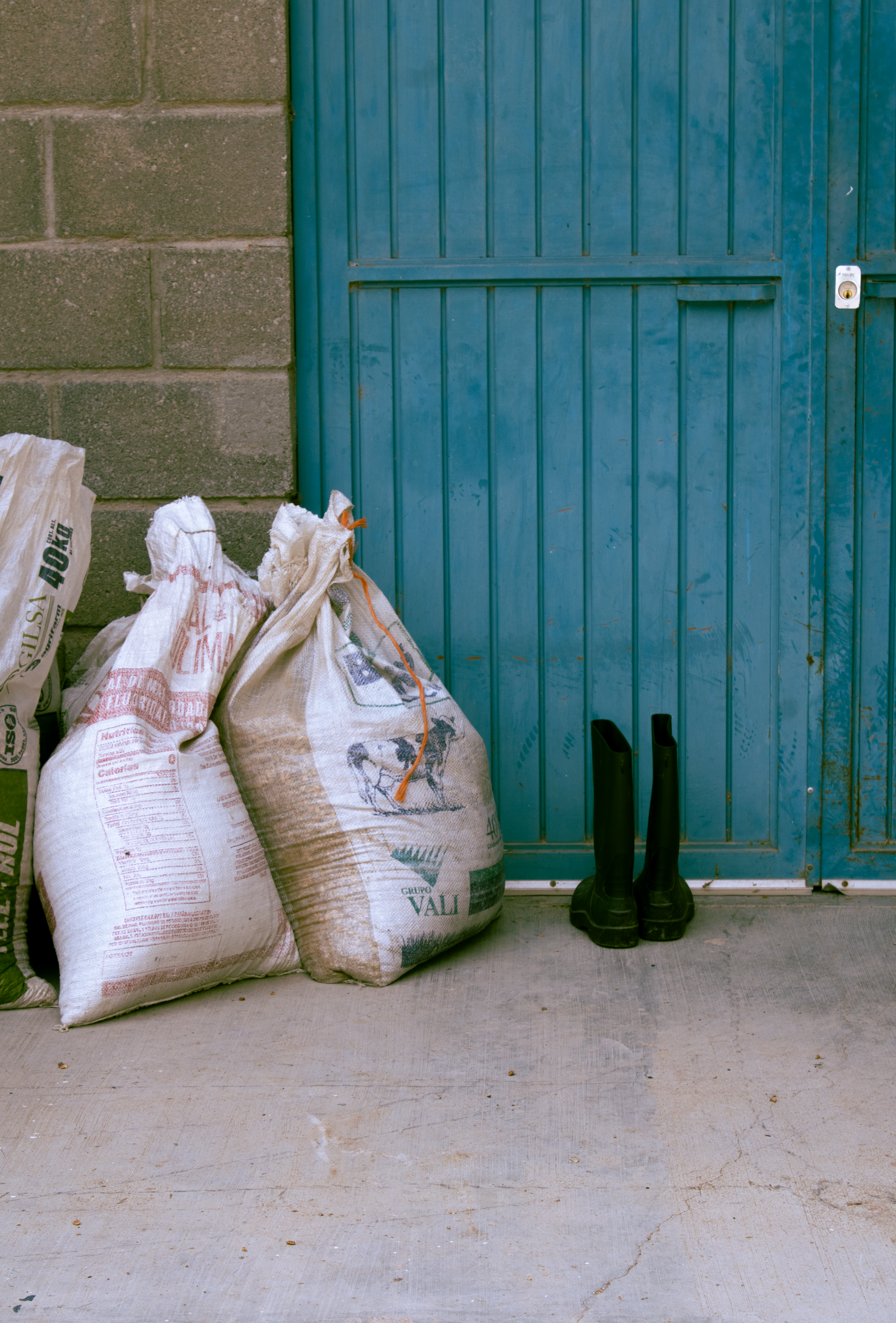 Industrial Storage Area with Boots and Bags · Free Stock Photo