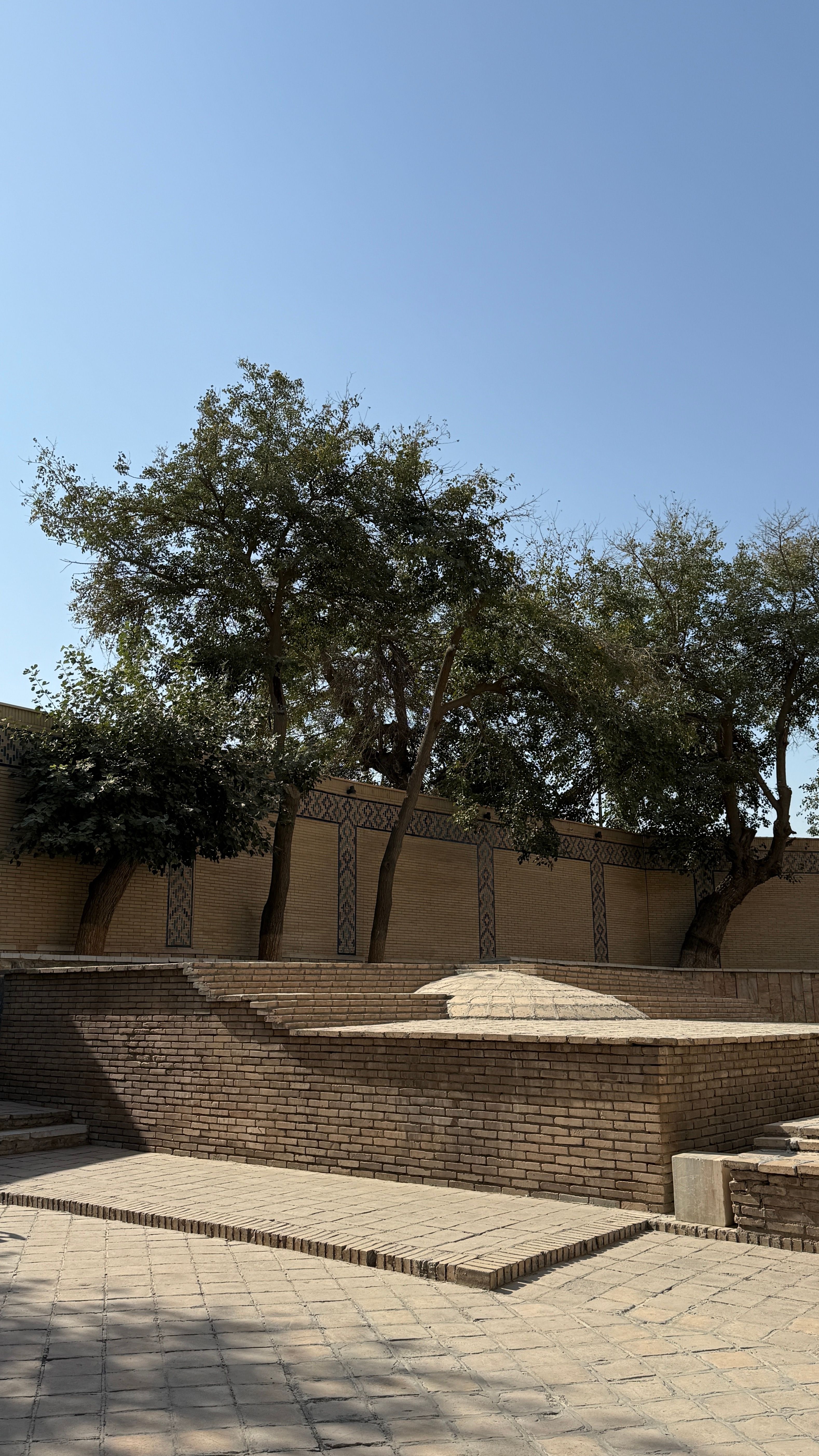Historical Brick Architecture with Trees · Free Stock Photo