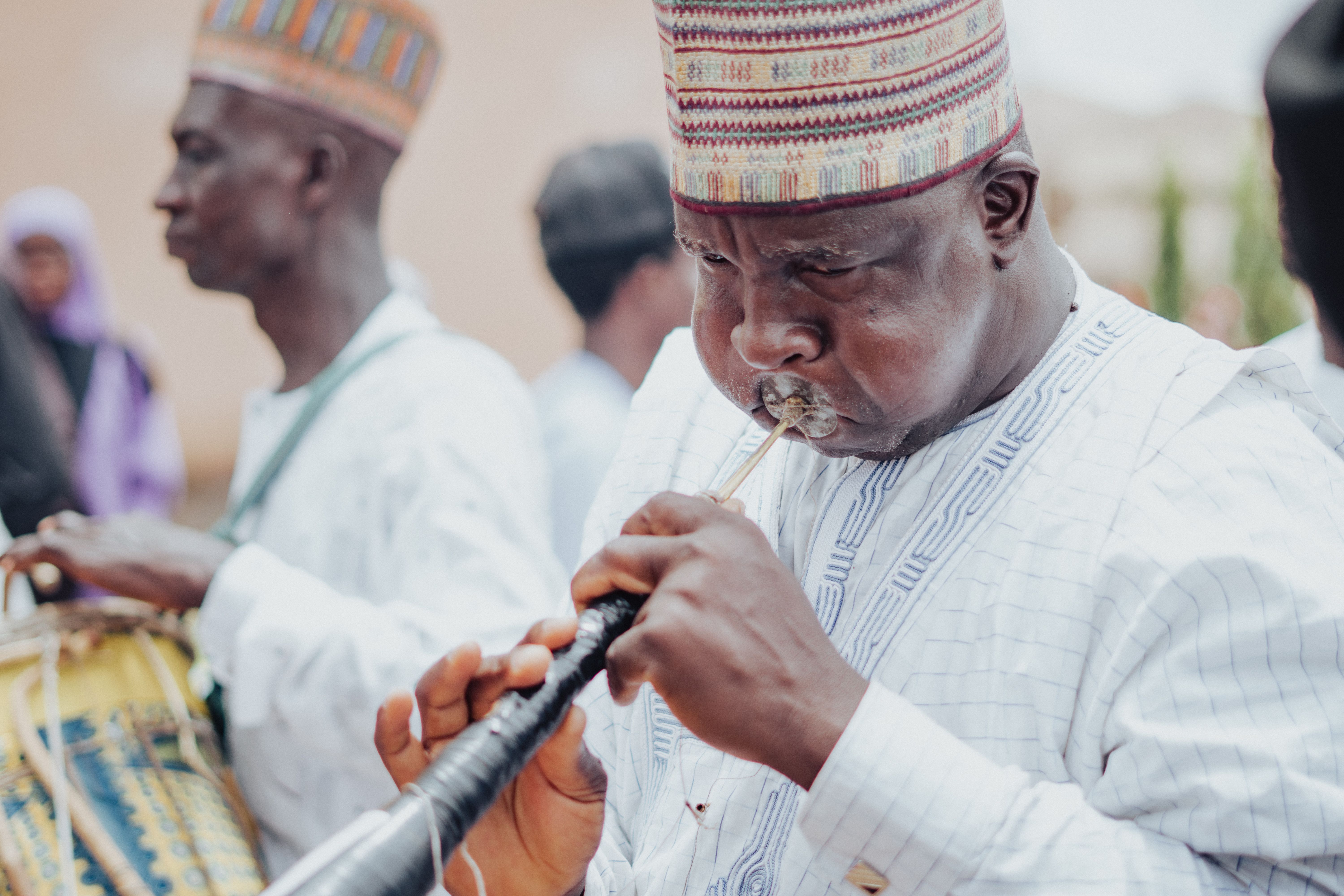 Traditional African Musician Playing Wind Instrument · Free Stock Photo