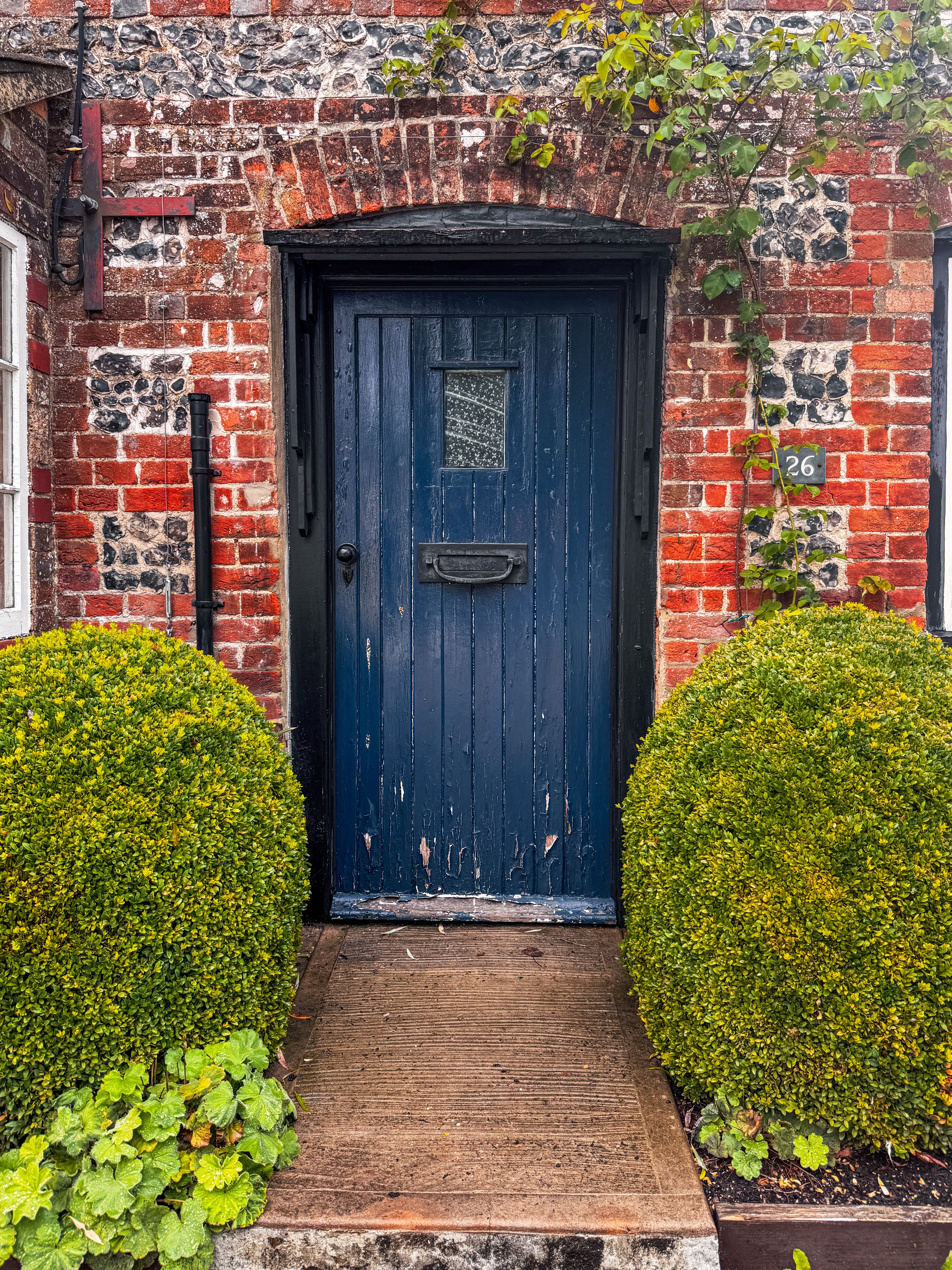 Rustic Blue Door in English Countryside Setting · Free Stock Photo