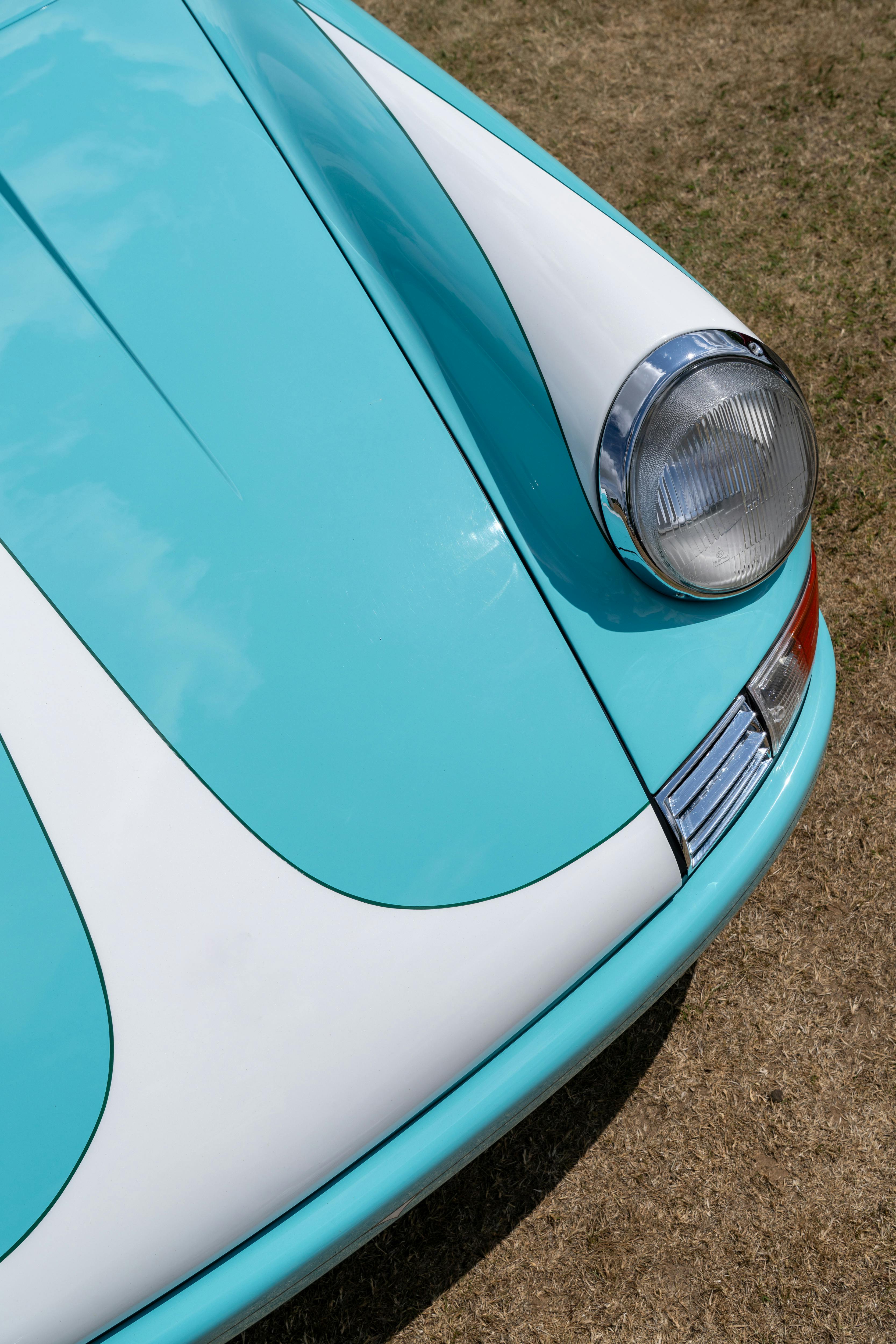 Vintage Turquoise Car Hood with Classic Design · Free Stock Photo