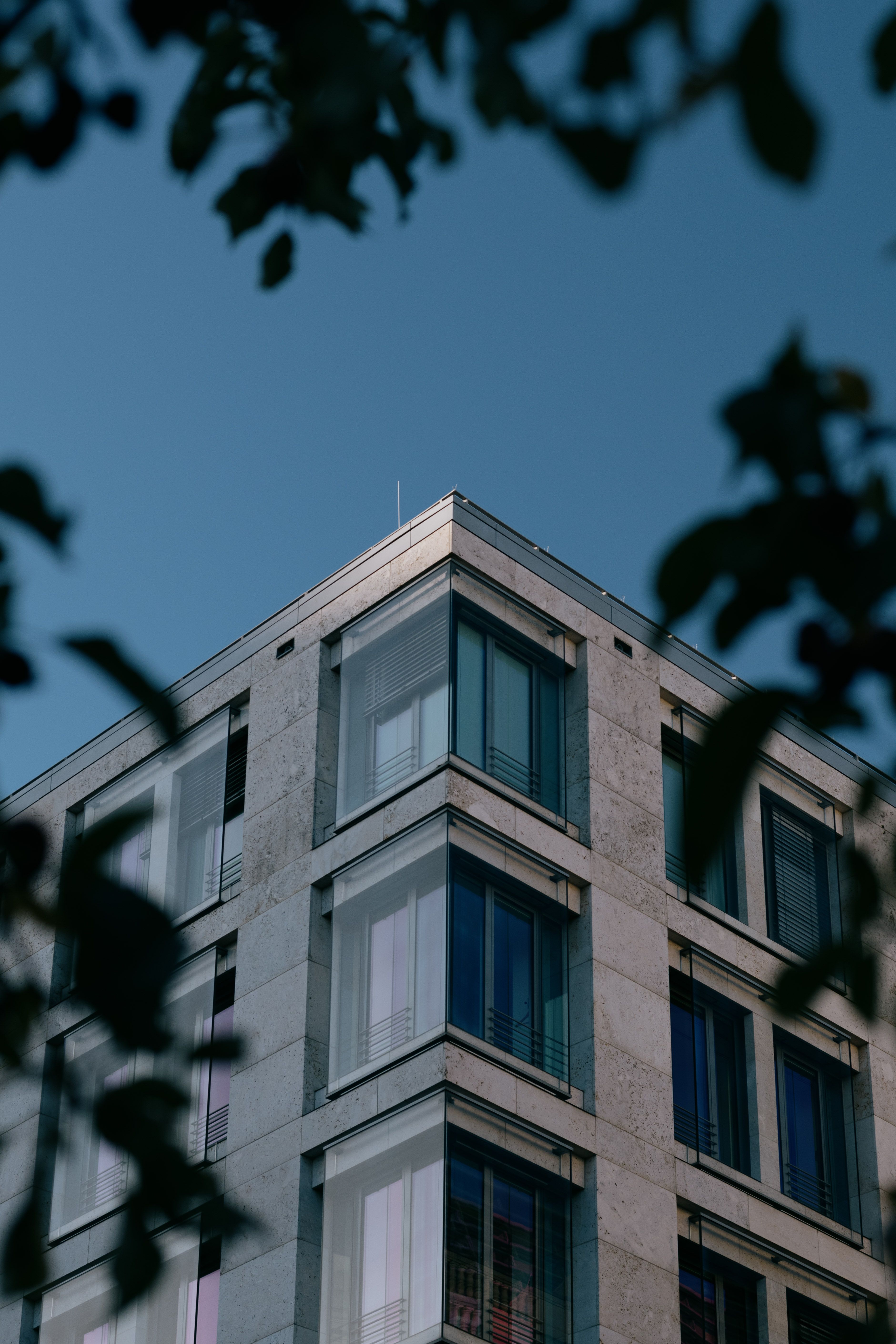 Modern Angular Building Against Clear Sky · Free Stock Photo