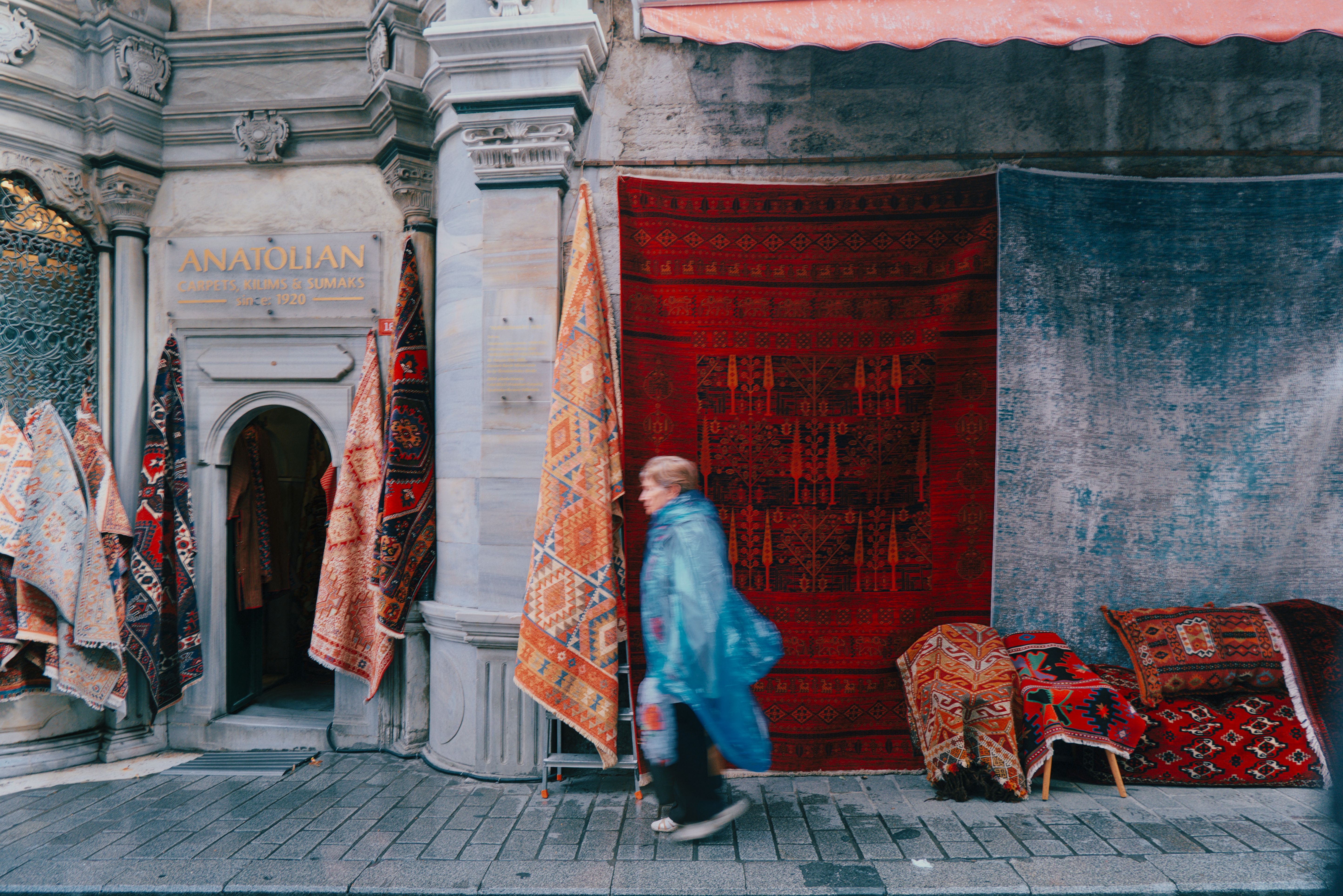 Vibrant Traditional Carpets Display in Istanbul Street · Free Stock Photo