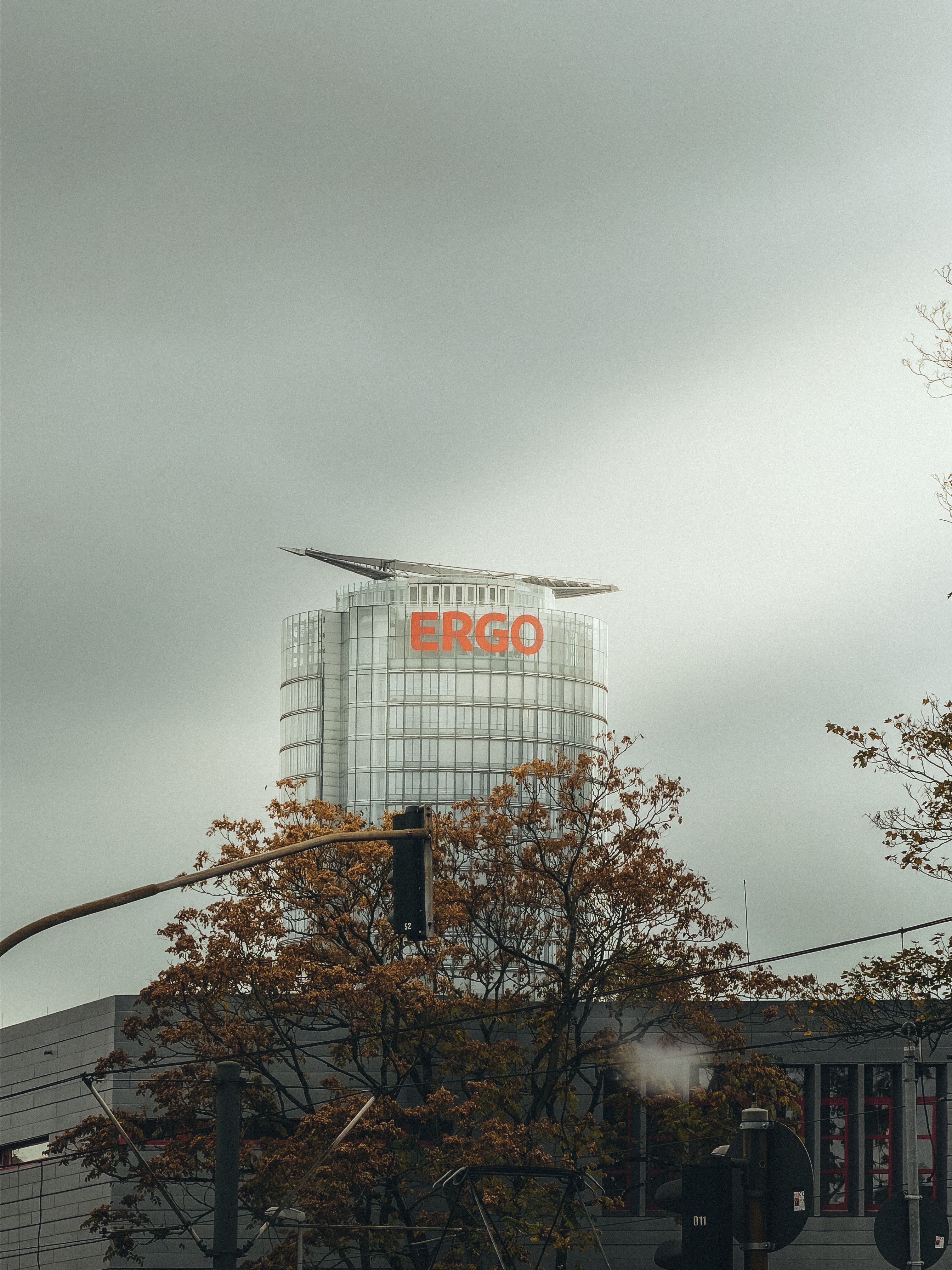 Modern ERGO Office Building in Fall Setting · Free Stock Photo