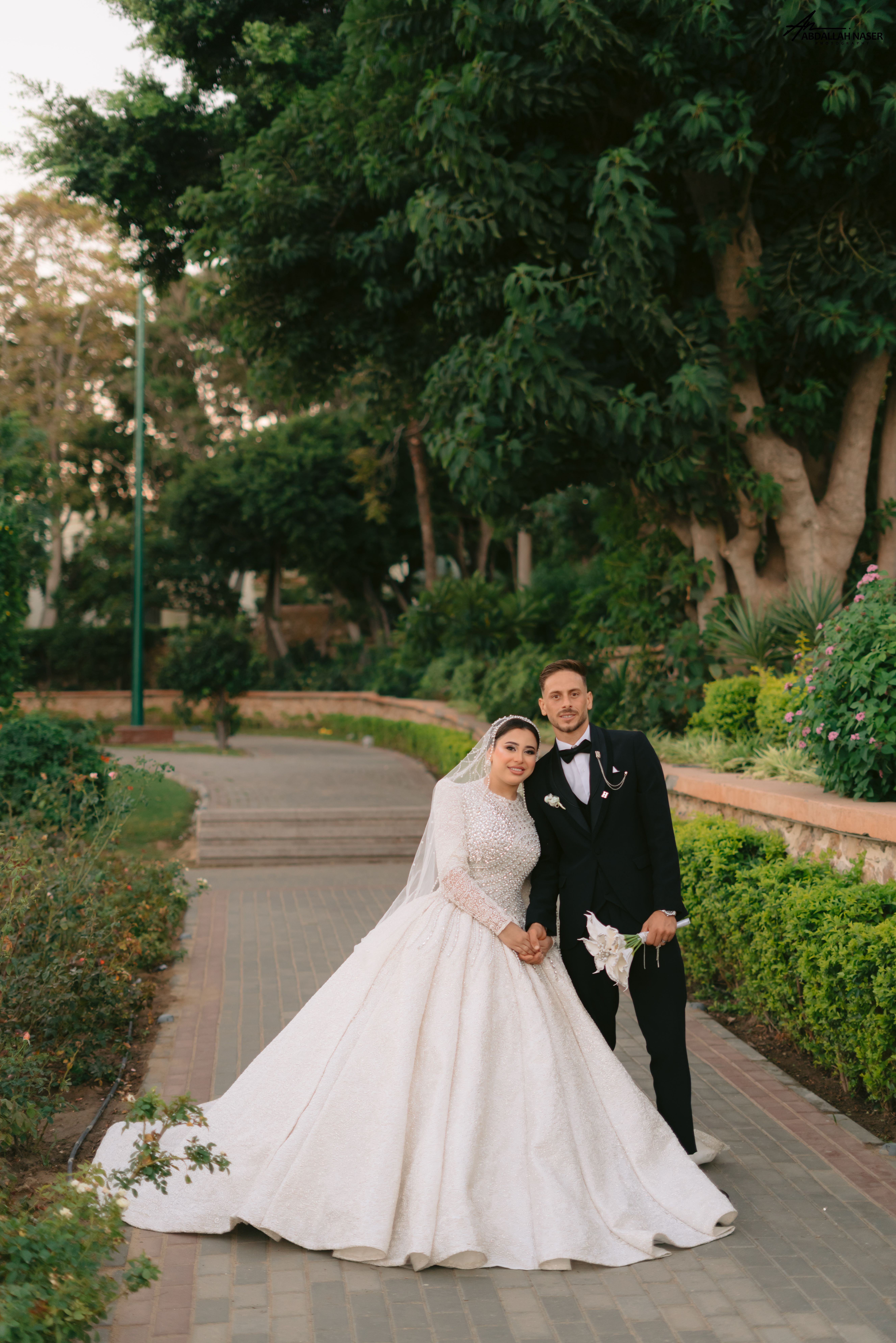 Elegant Outdoor Wedding Portrait of a Couple · Free Stock Photo