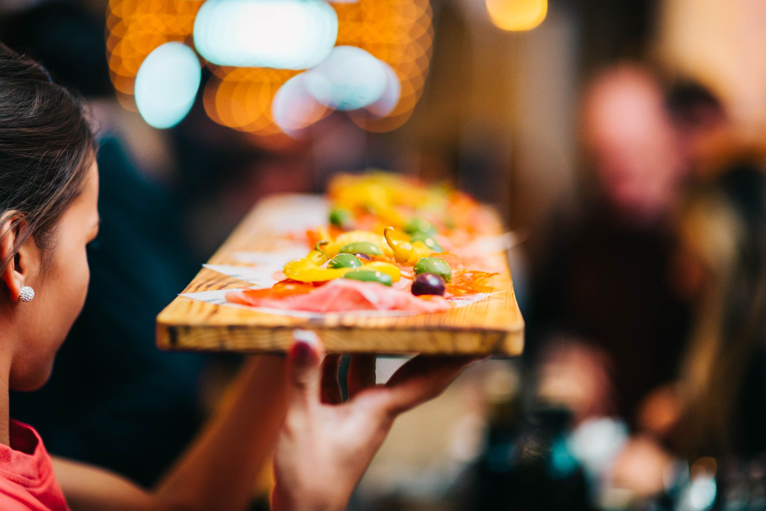 Server Presenting Colorful Appetizer Platter in Restaurant · Free Stock ...