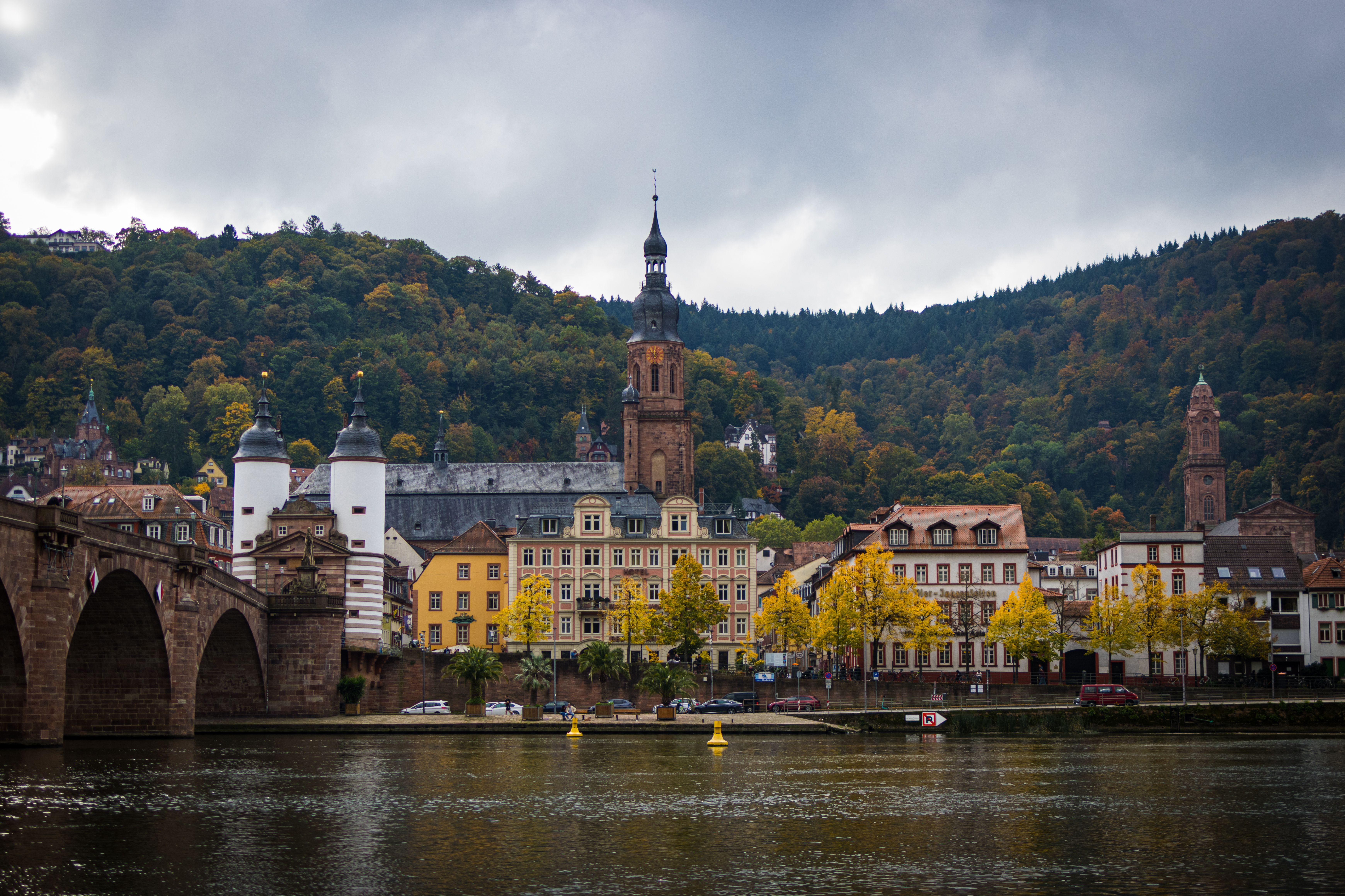 Castle on Hill over Village Near Body of Water · Free Stock Photo