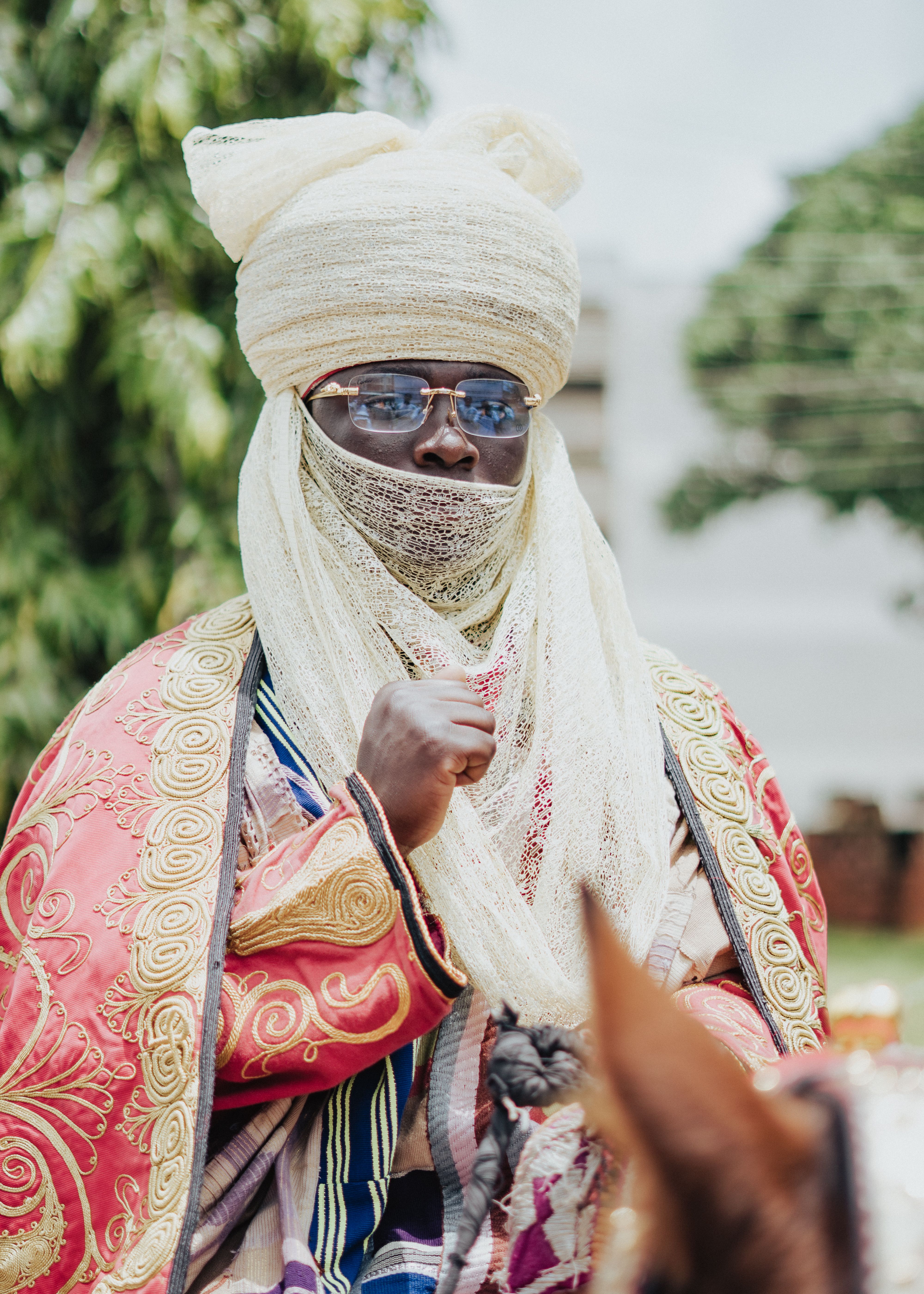 Traditional African Chief in Ornate Attire · Free Stock Photo