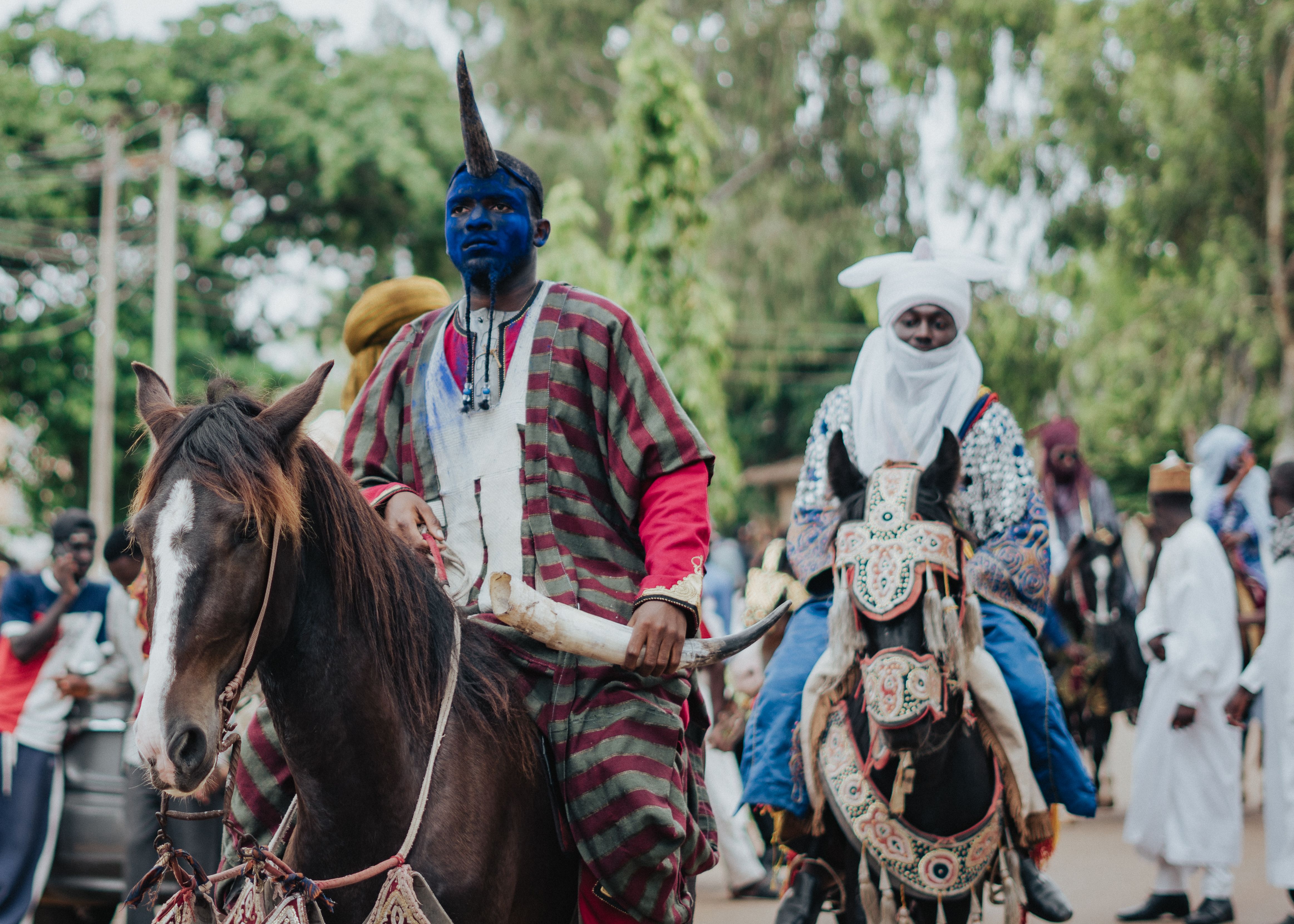 Traditional Horseback Festival in Colorful Attire · Free Stock Photo