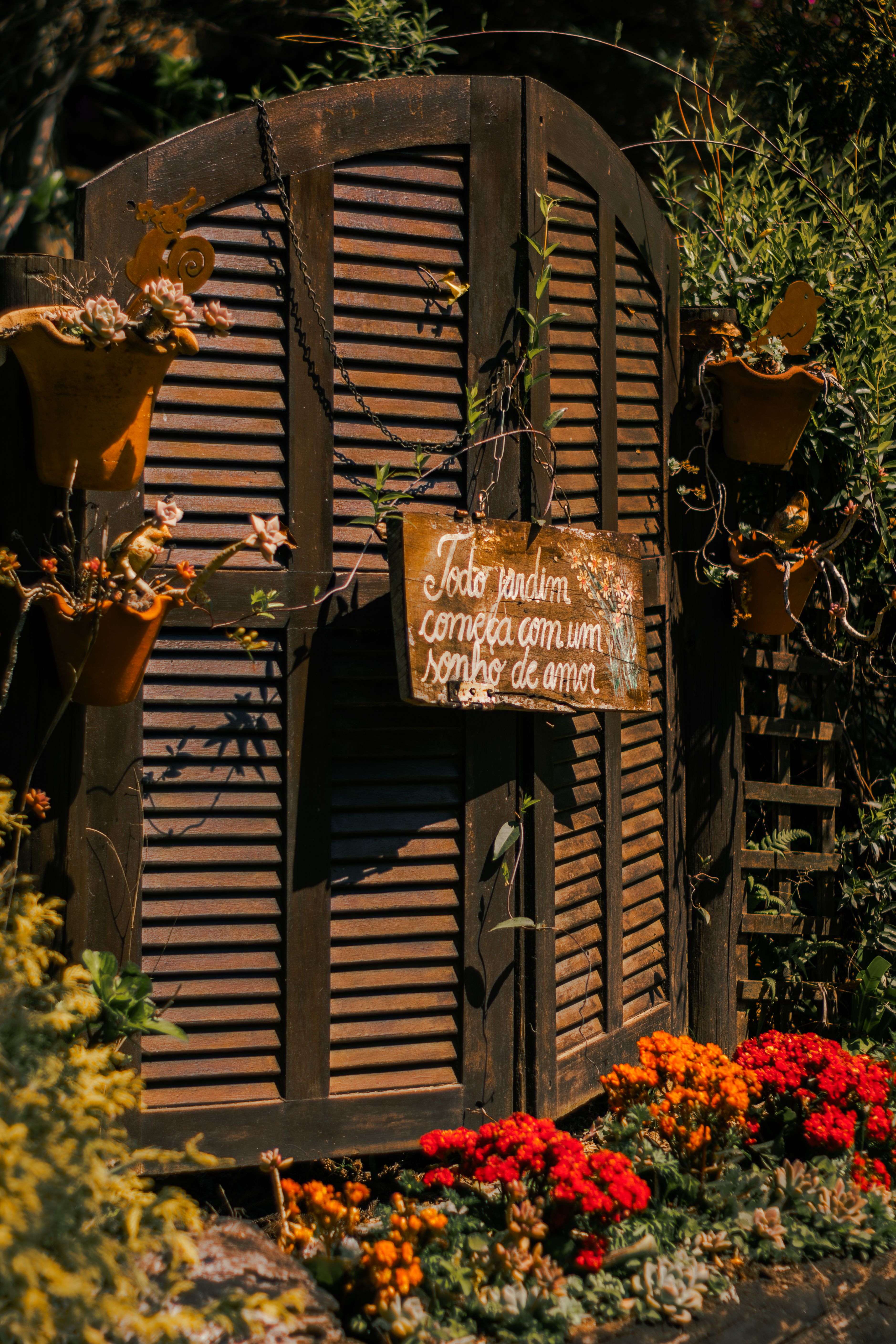 Creative Insect Hotel in Lush Garden Setting · Free Stock Photo