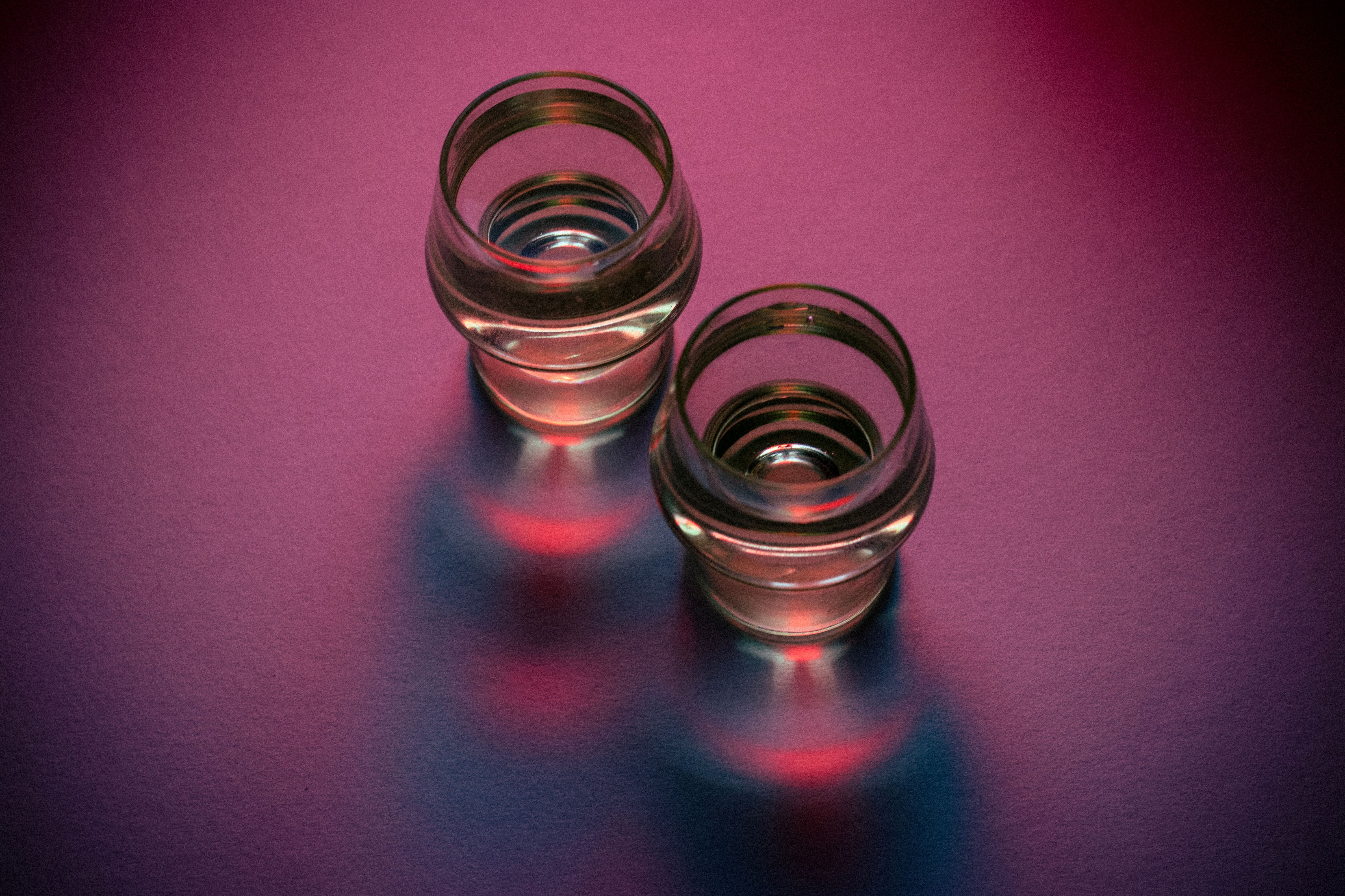 Elegant Glassware with Vibrant Lighting · Free Stock Photo