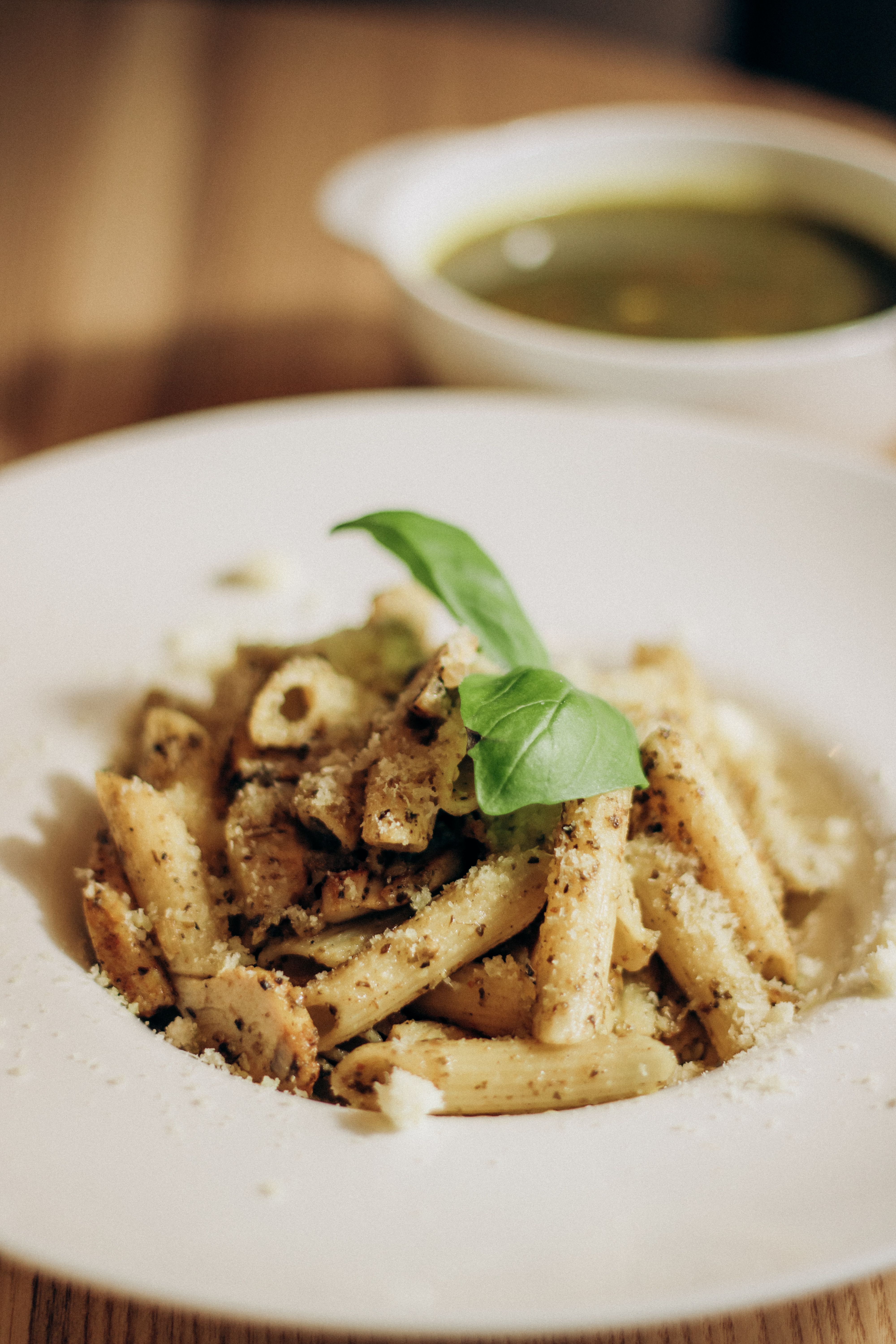 Delicious Penne Pasta with Basil Garnish · Free Stock Photo
