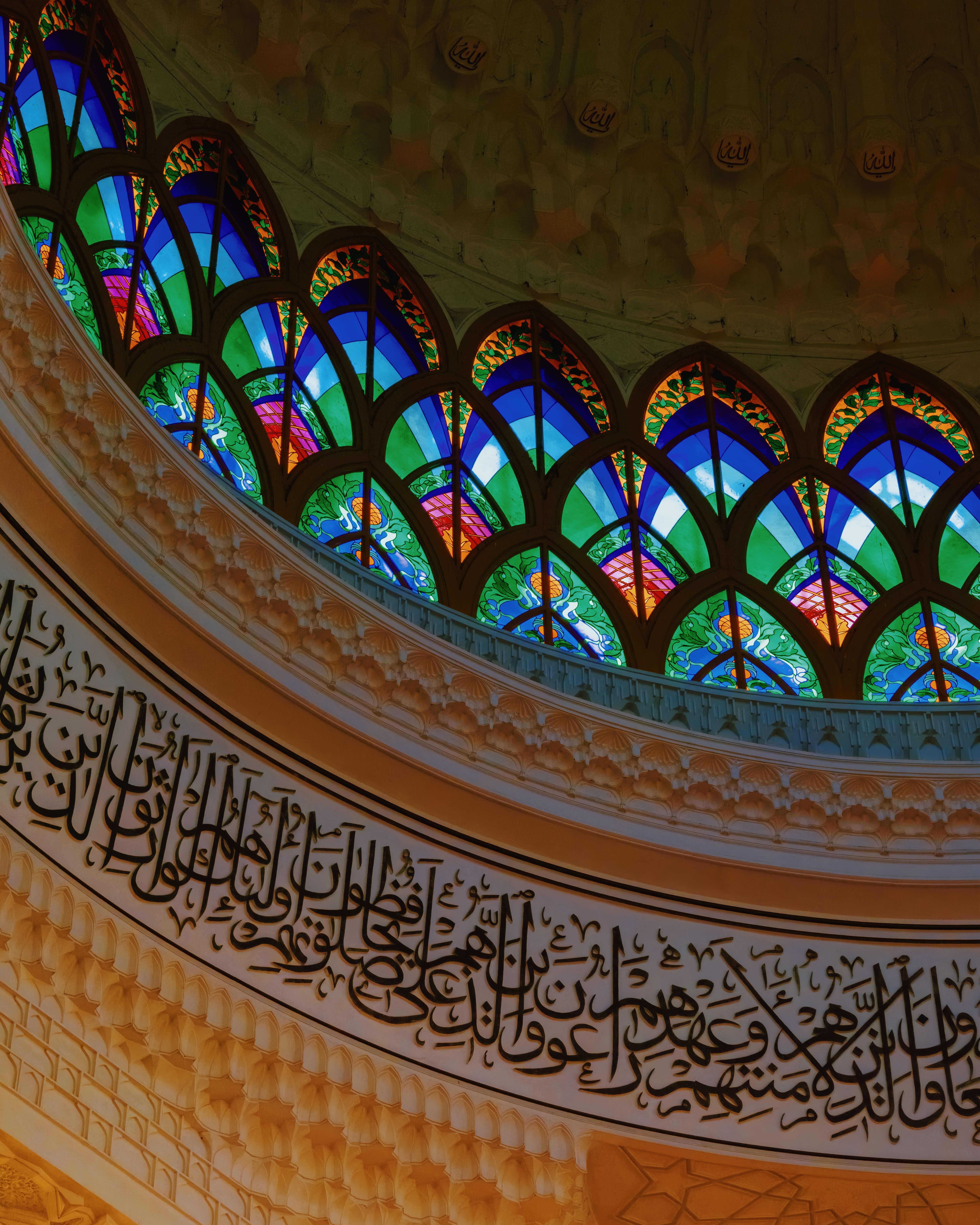 Vibrant Stained Glass and Arabic Calligraphy in Mosque · Free Stock Photo