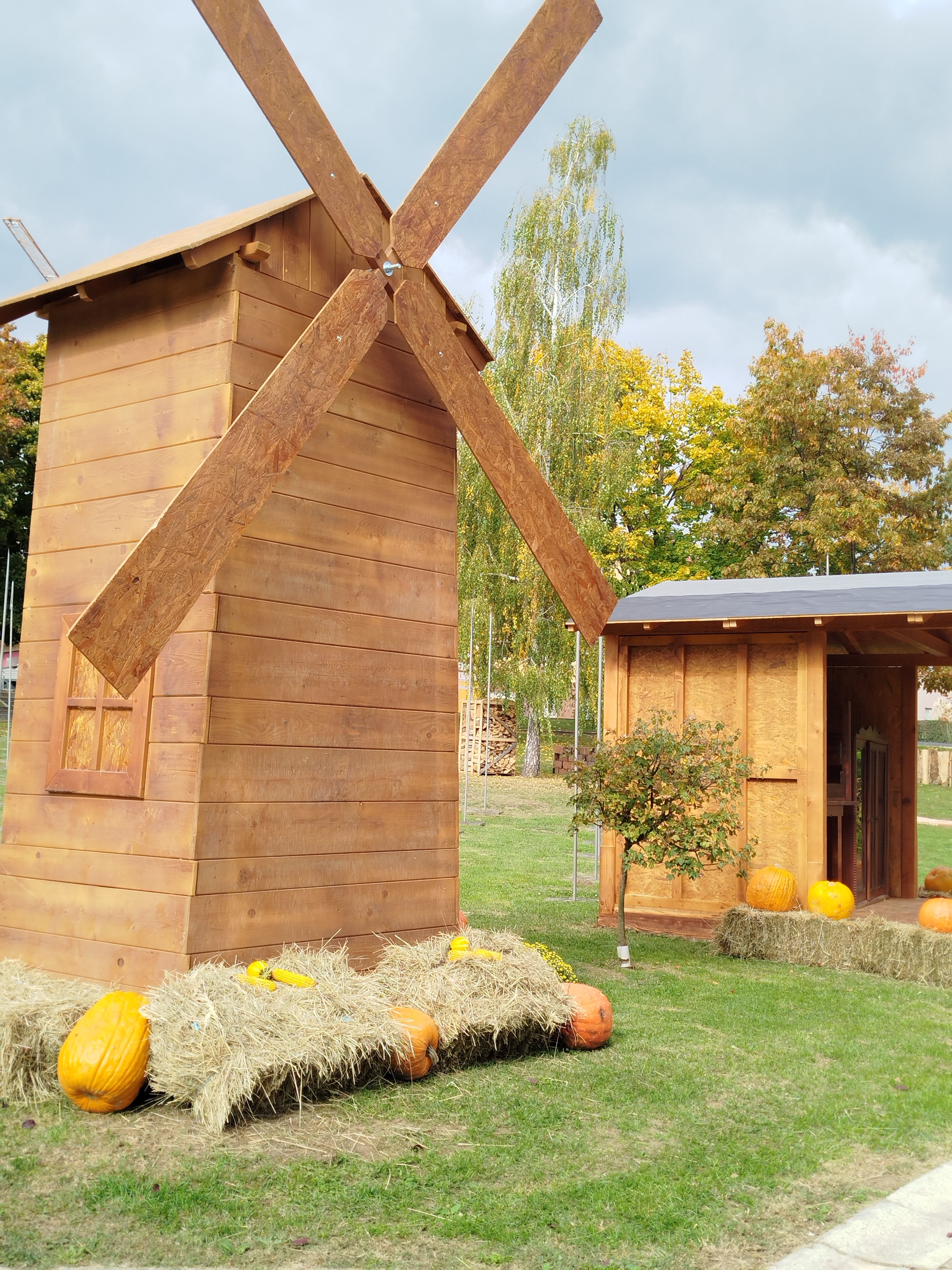 Rustic Windmill and Pumpkins in Autumn Setting · Free Stock Photo