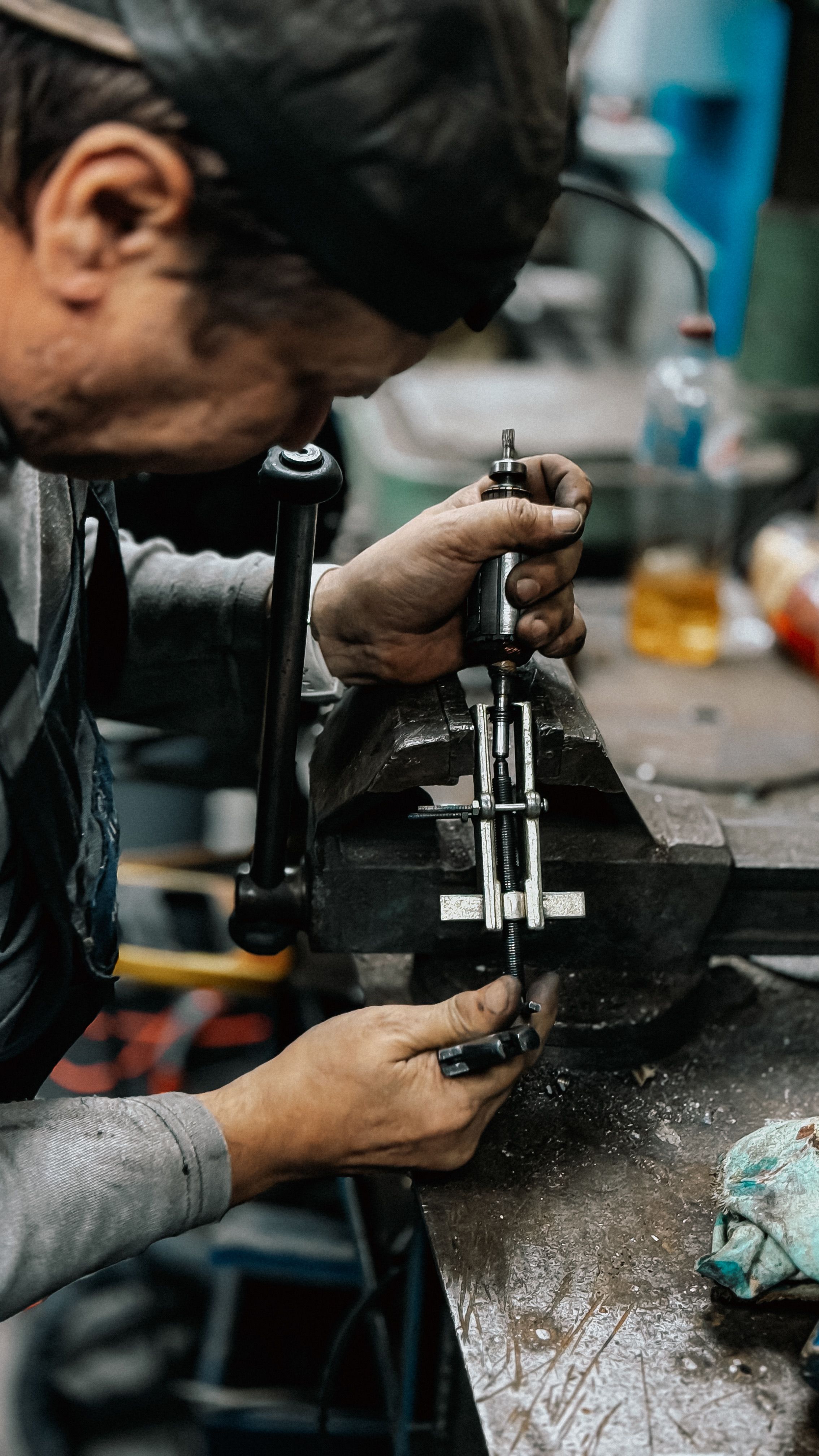Skilled Worker in Workshop Using Power Tool · Free Stock Photo