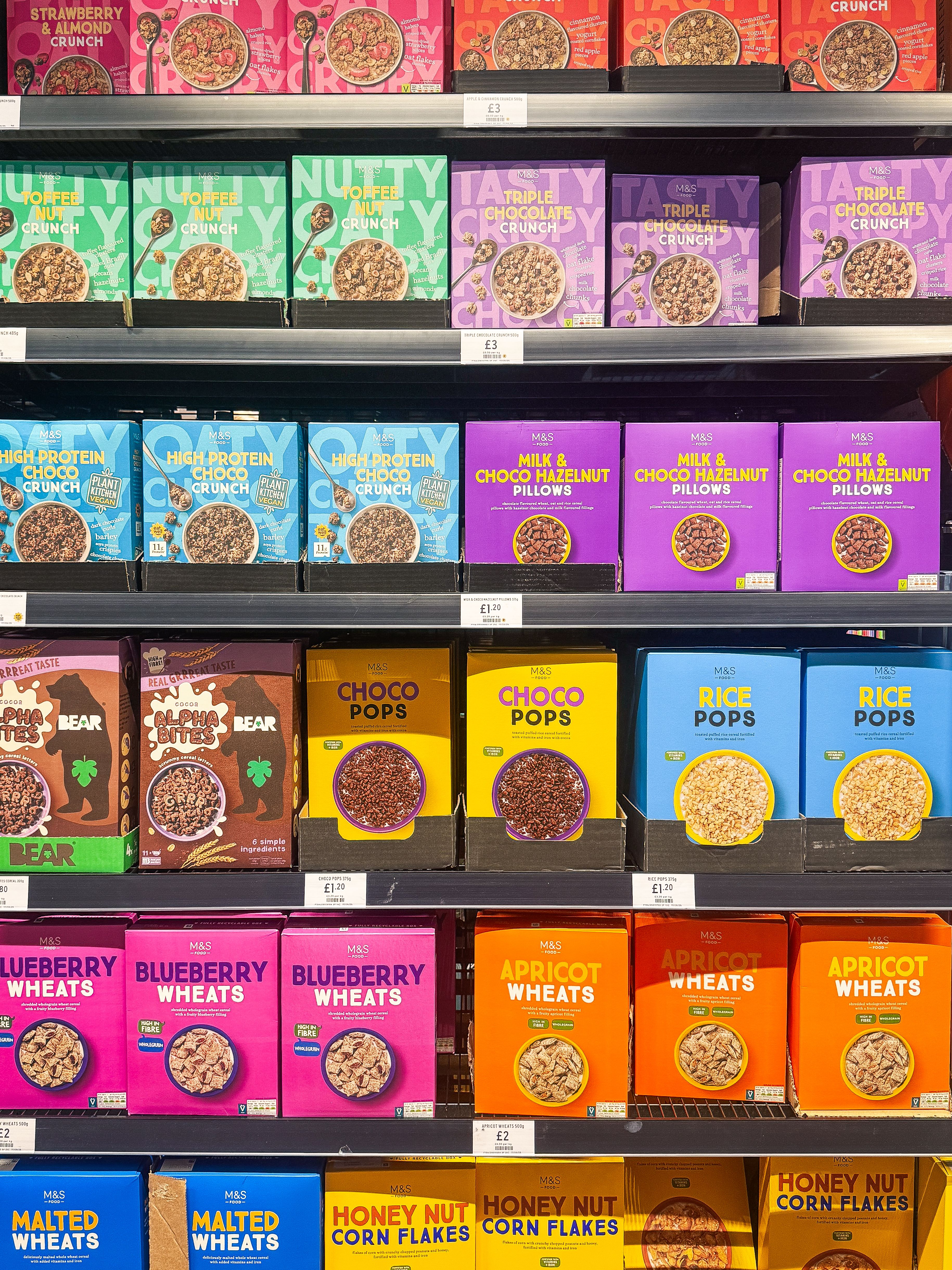 Colorful Supermarket Cereal Aisle Display · Free Stock Photo