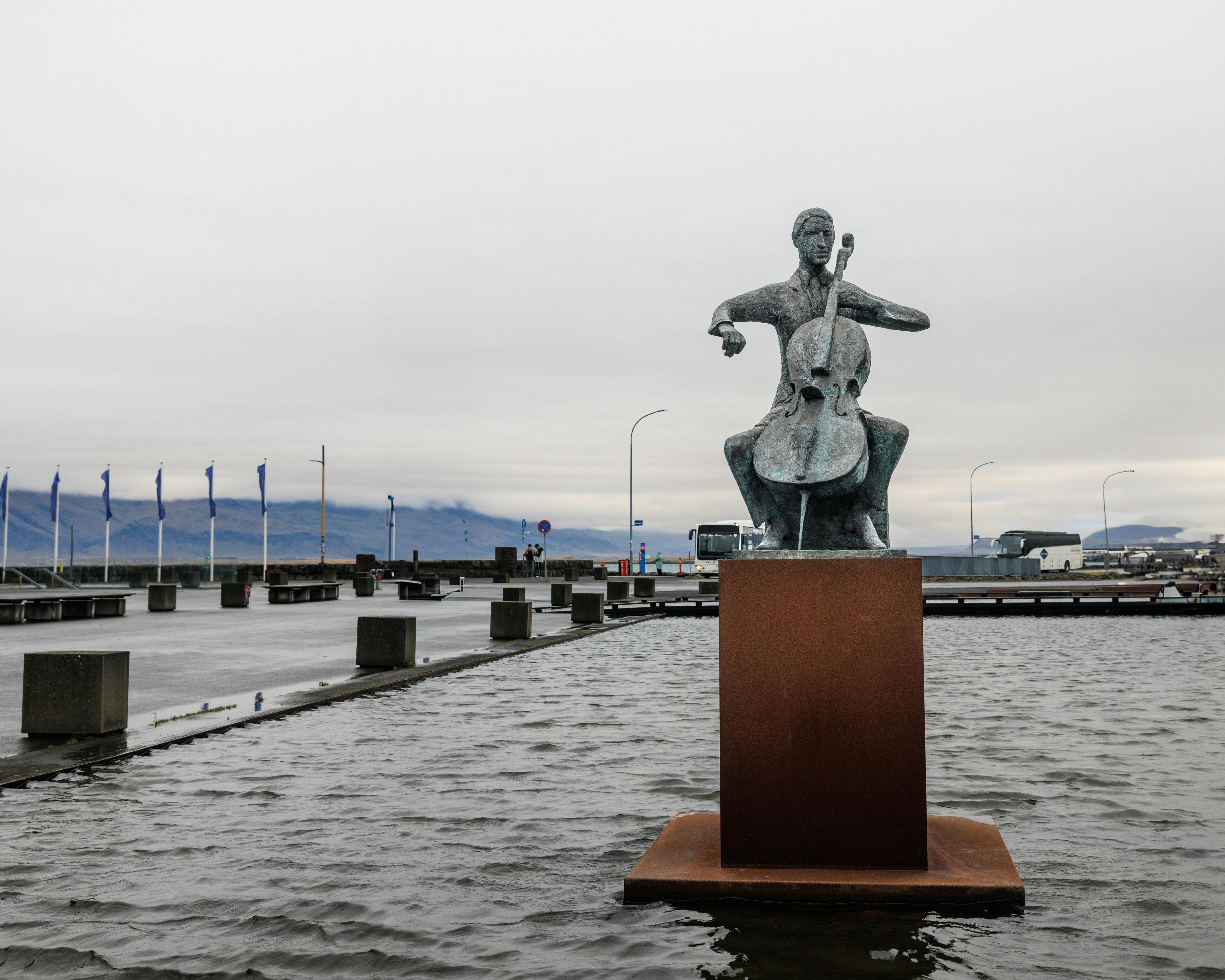 Statue of Musician Playing Cello in Reykjavik · Free Stock Photo