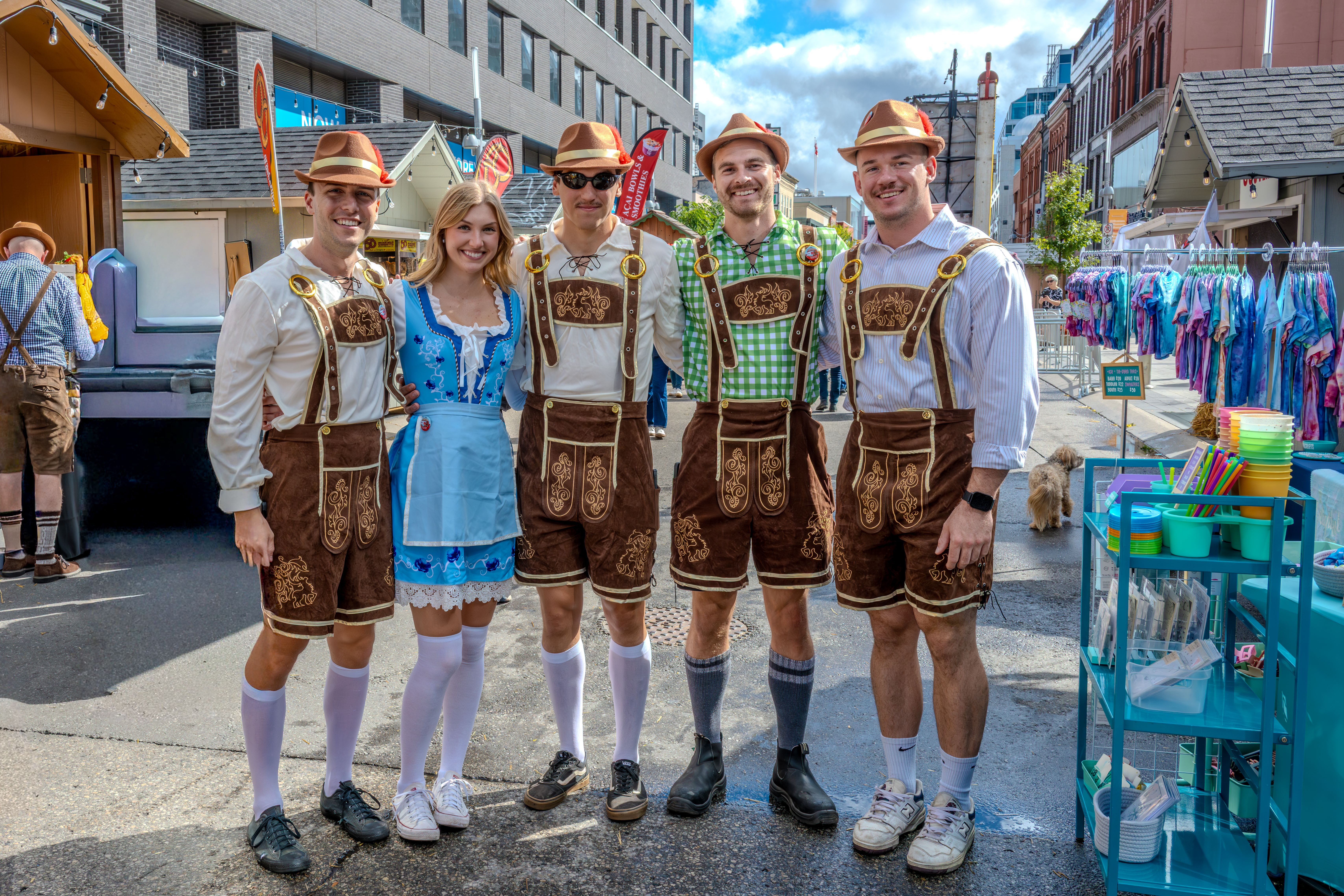 Group Wearing Traditional German Attire Outdoors · Free Stock Photo