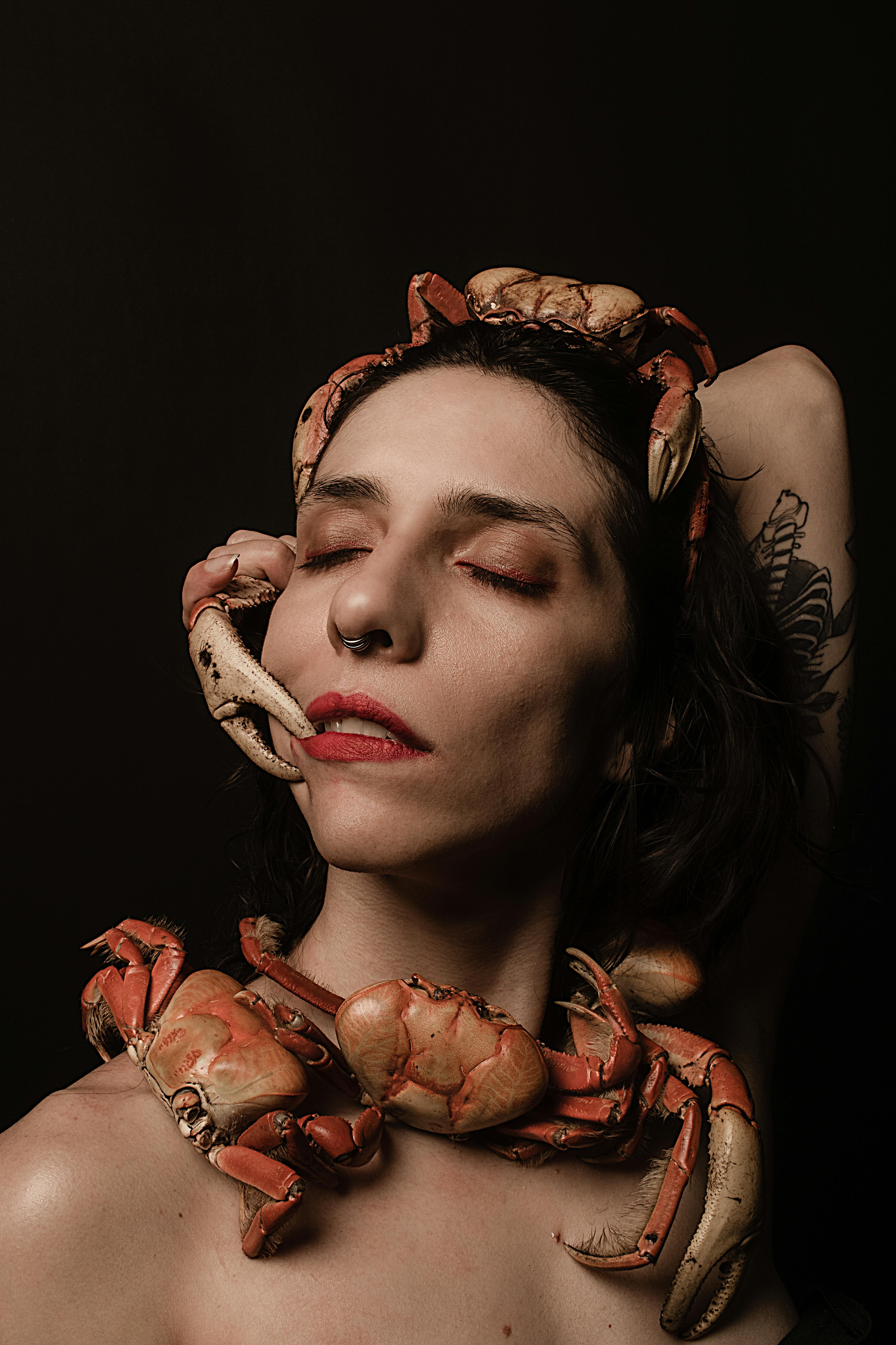 Dramatic Portrait with Crabs and Tattoos · Free Stock Photo