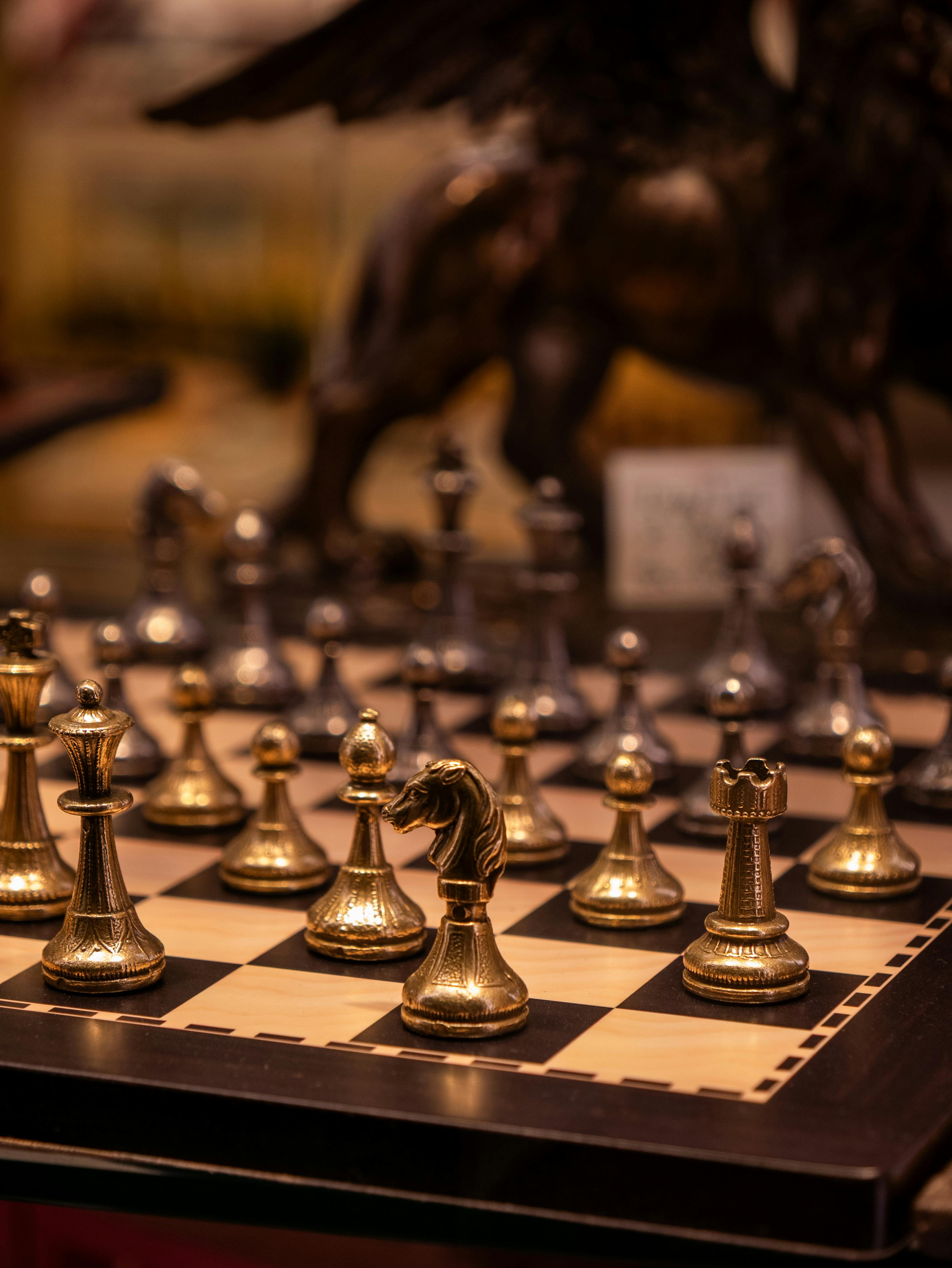 Elegant Golden Chess Set on Display · Free Stock Photo