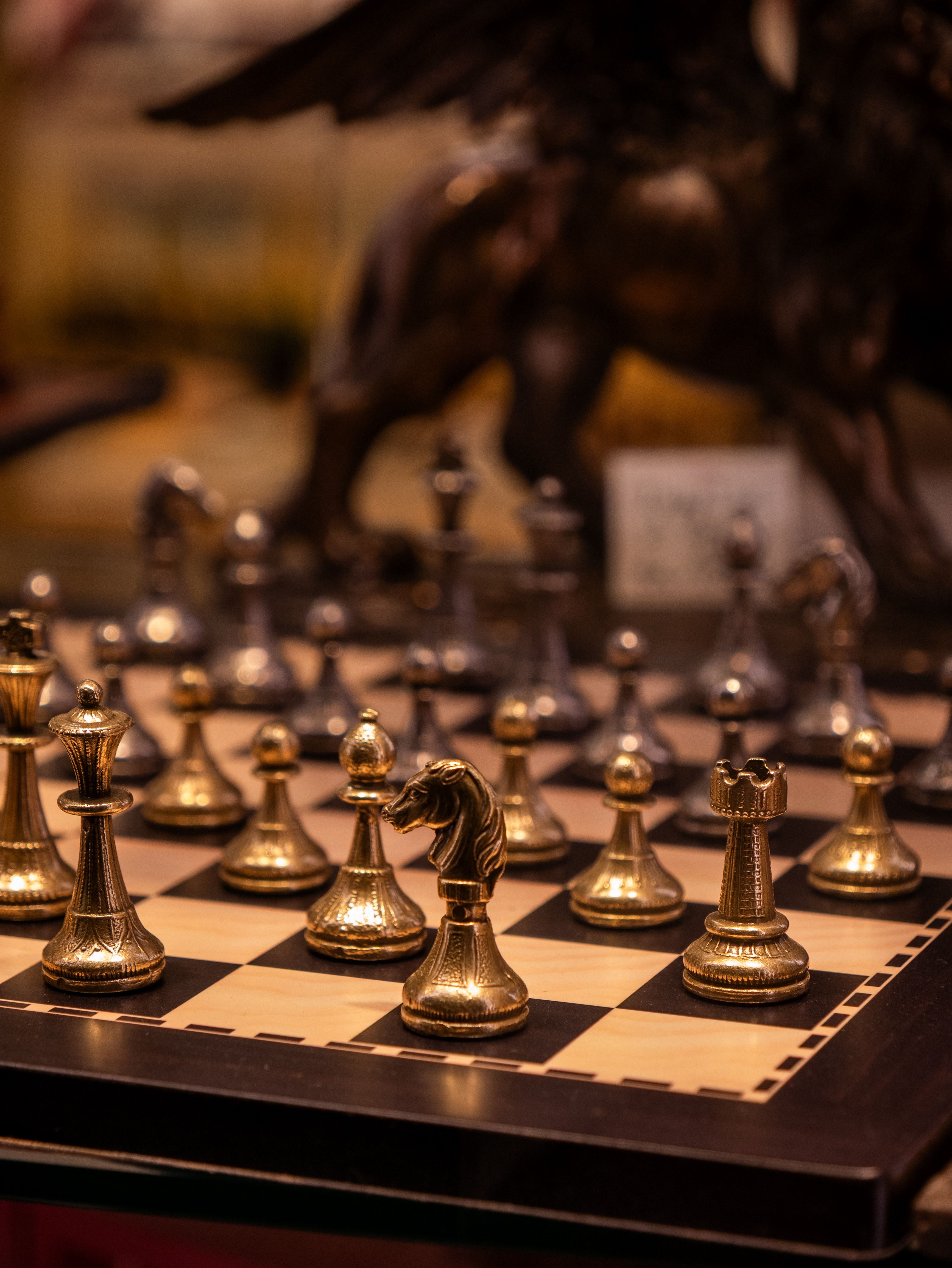 Elegant Golden Chess Set on Display · Free Stock Photo