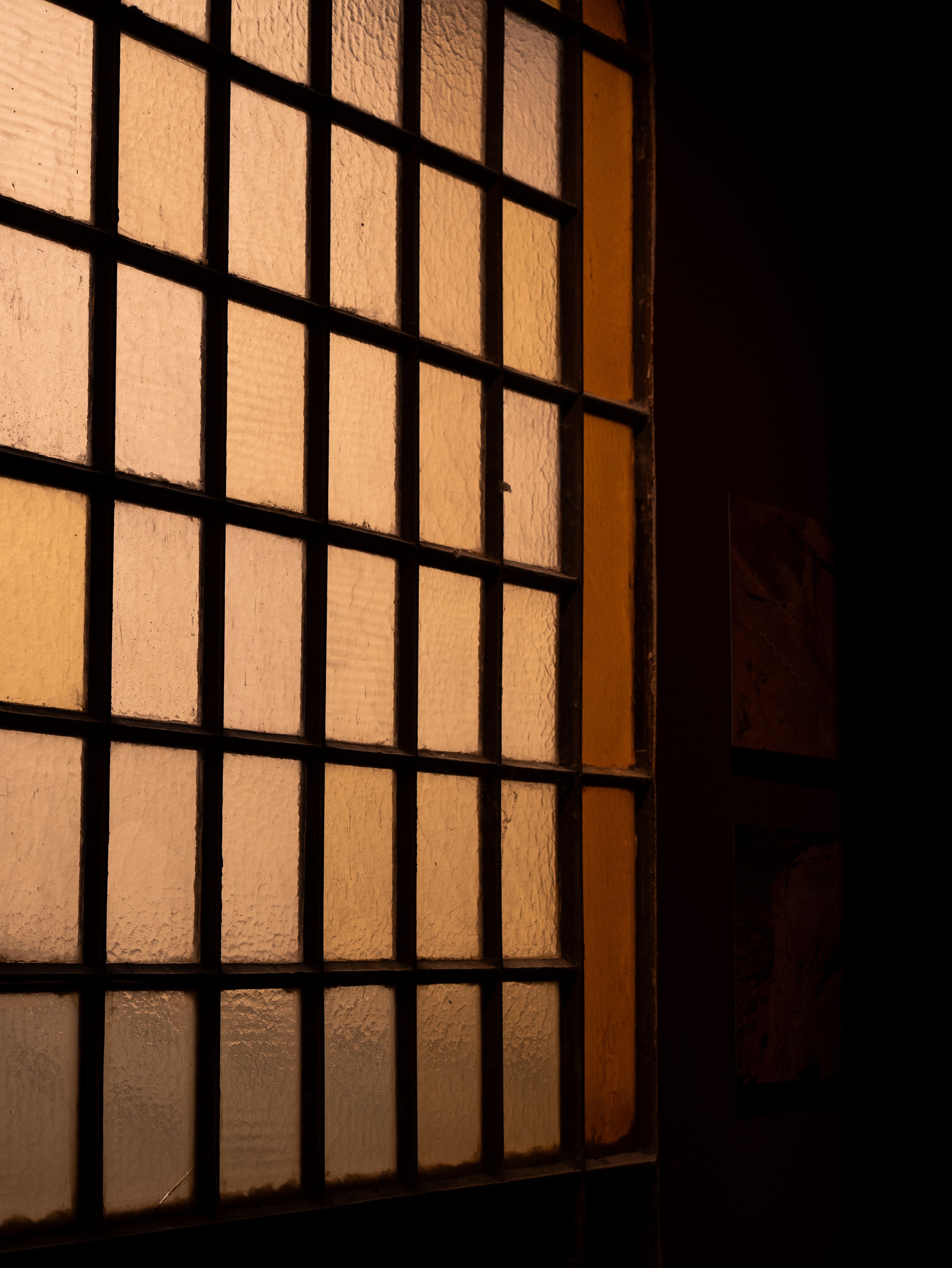 Warm Light Through Patterned Glass Window · Free Stock Photo