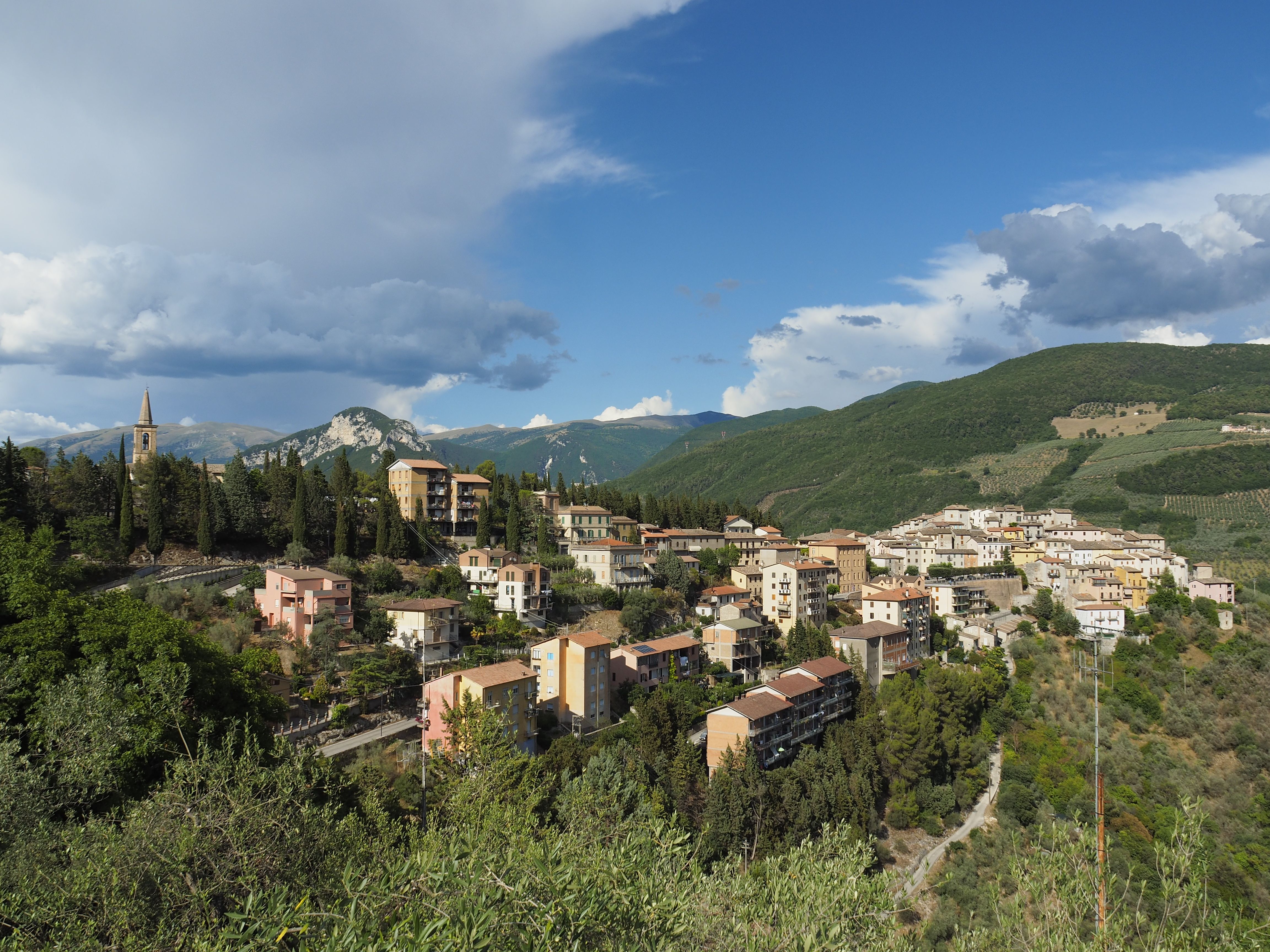 Charming Italian Hill Town Amidst Verdant Hills · Free Stock Photo