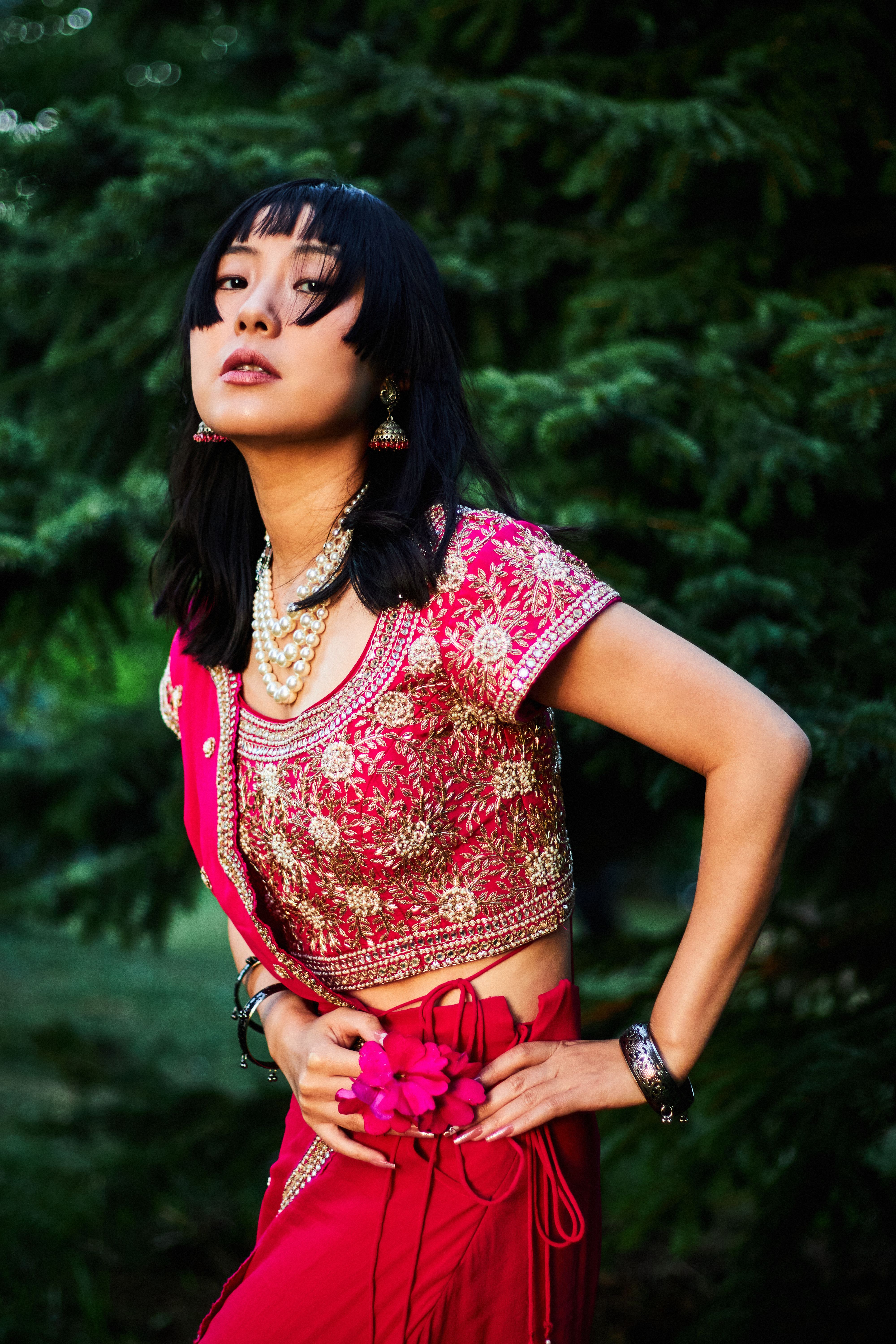 Elegant Woman in Traditional Pink Indian Attire Outdoors · Free Stock Photo